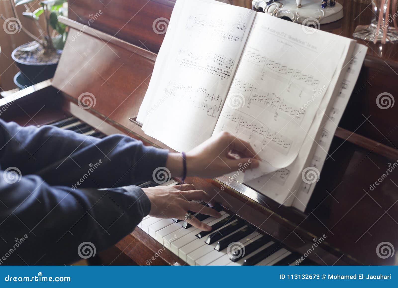 Passing Music Sheets while Playing Piano Stock Image - Image of ...