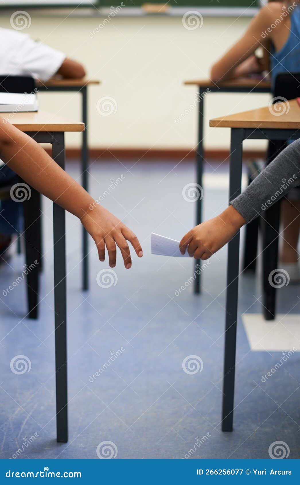 Passing a Note. Two Students Passing Notes during Class. Stock Image ... Passing a Note. Two Students Passing Notes during Class. Stock Image ...