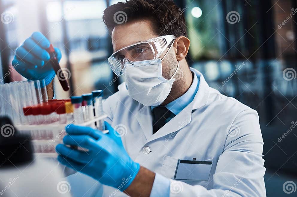 Passionate about Exploring Science. a Young Male Scientist Working in a ...