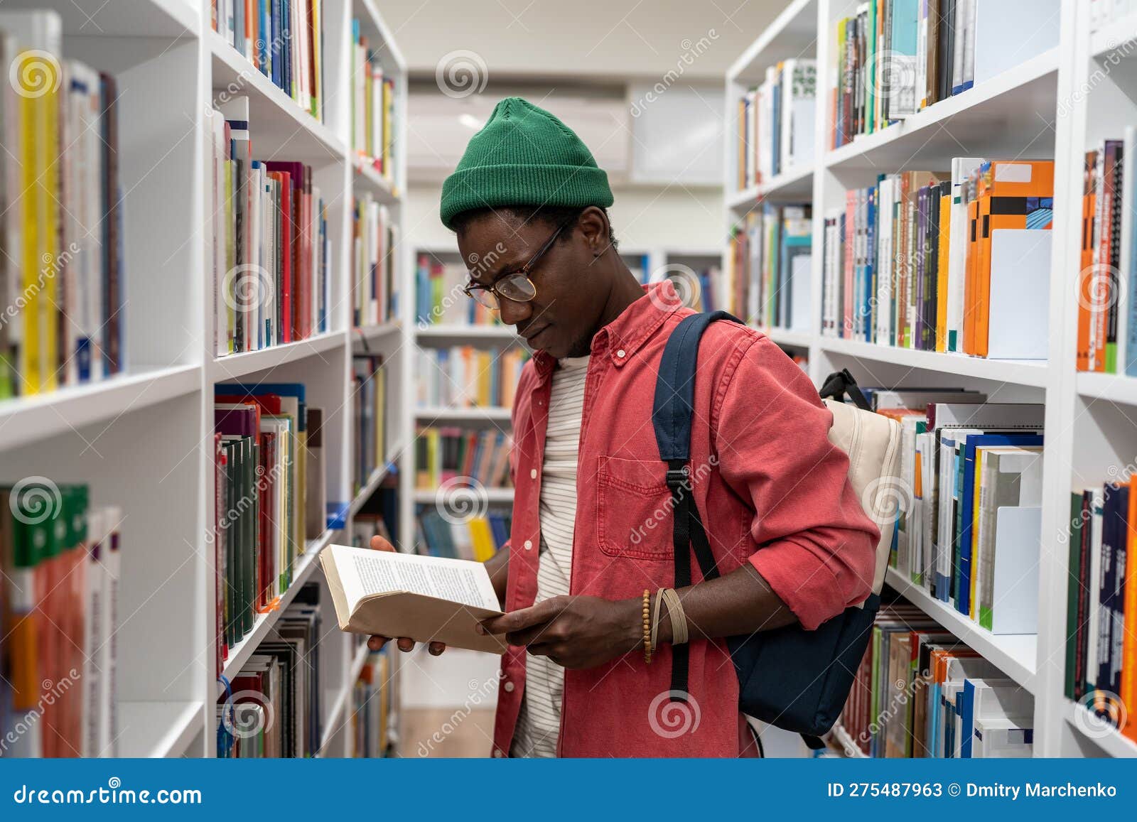 Passionate Reader Student African American Guy Choosing Research Textbooks in University Library ...