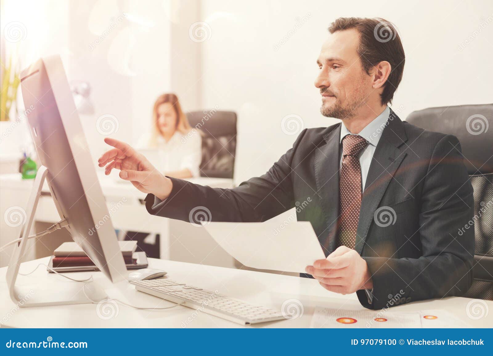 Passionate Resourceful Businessman Comparing the Data Stock Photo ...