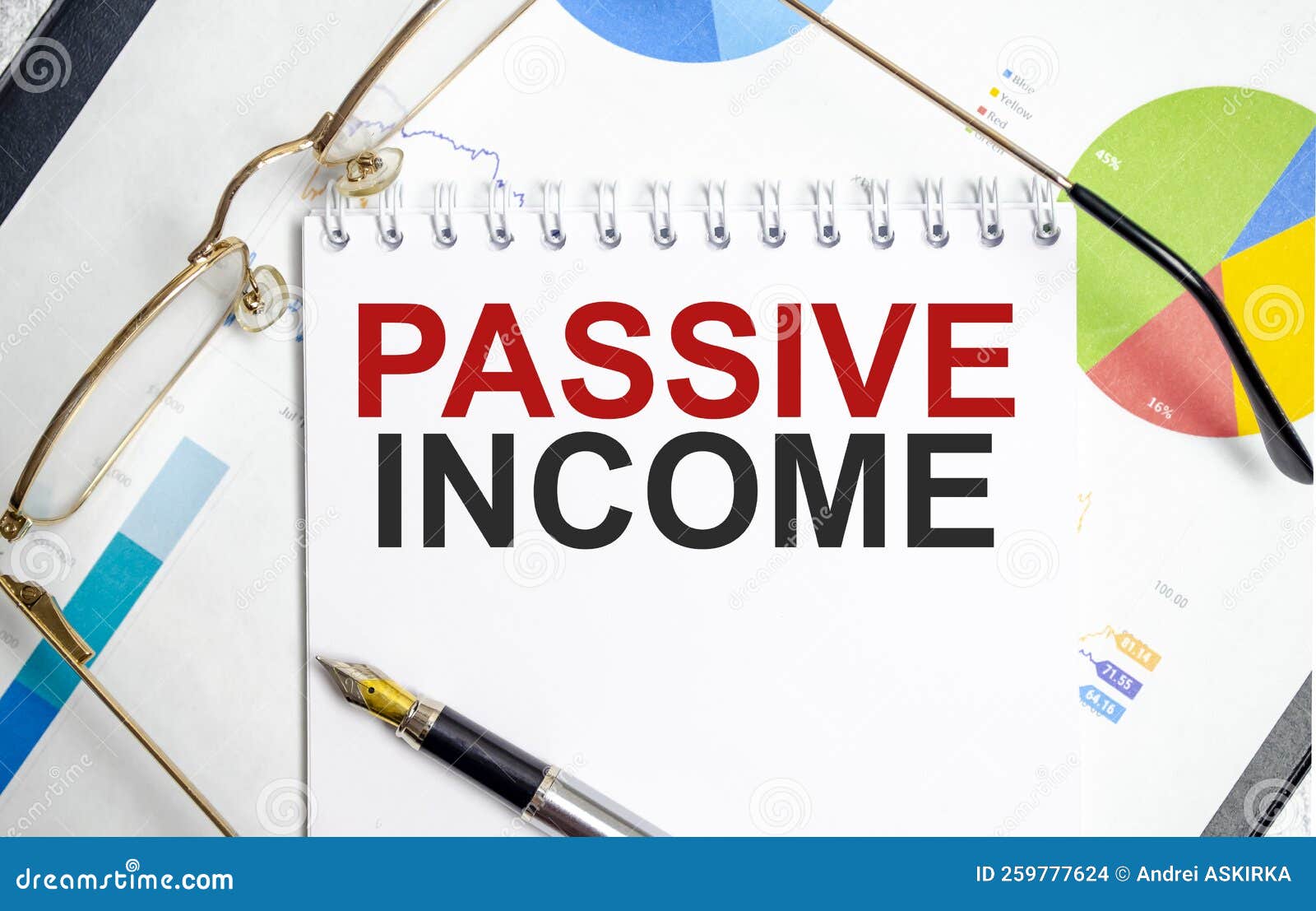 Passive Income Words on Notepad and Glasses with Charts Stock Photo ...