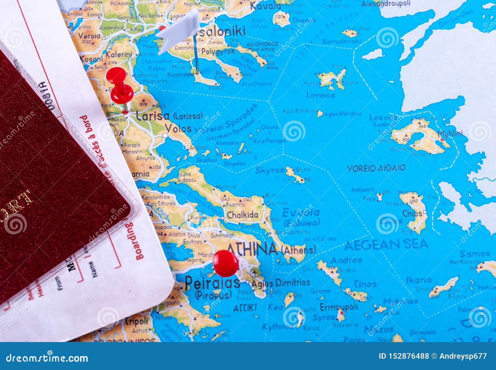 Passport with a Boarding Pass and a Map with Marked Destination Points ...