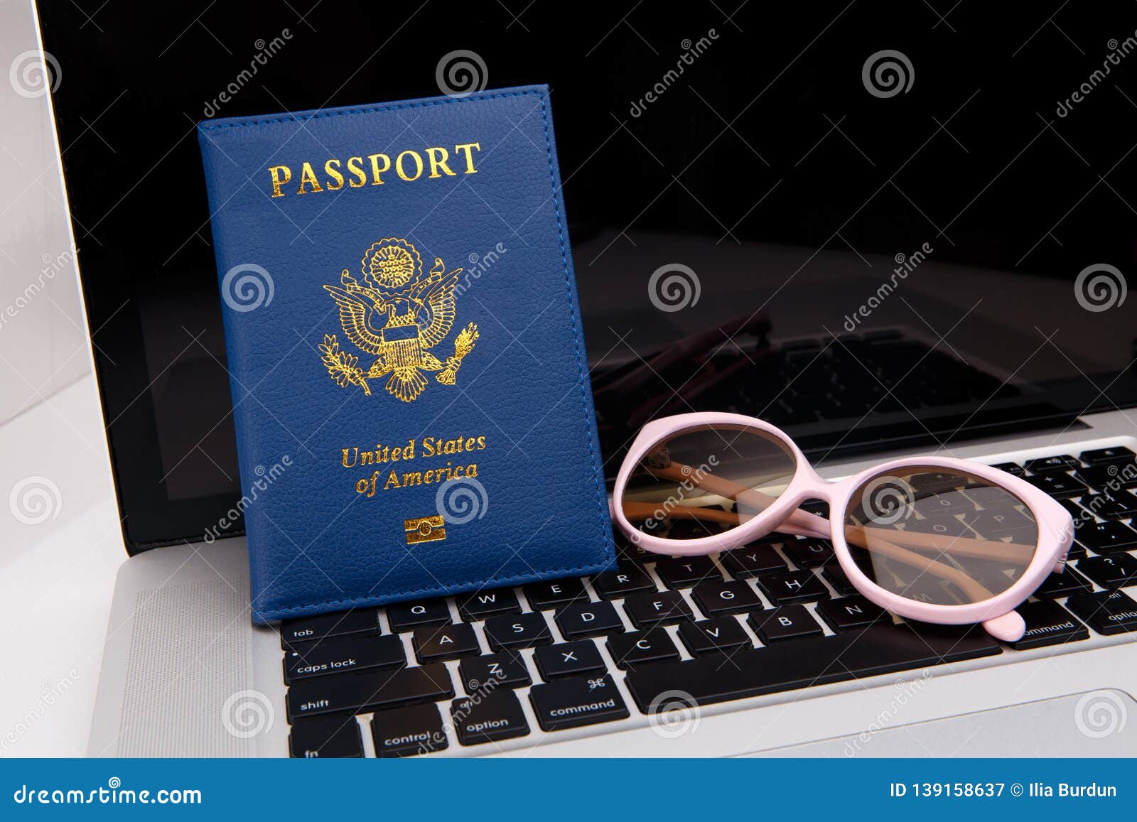 Passport Book with Laptop Computer on Table Stock Image - Image of ...