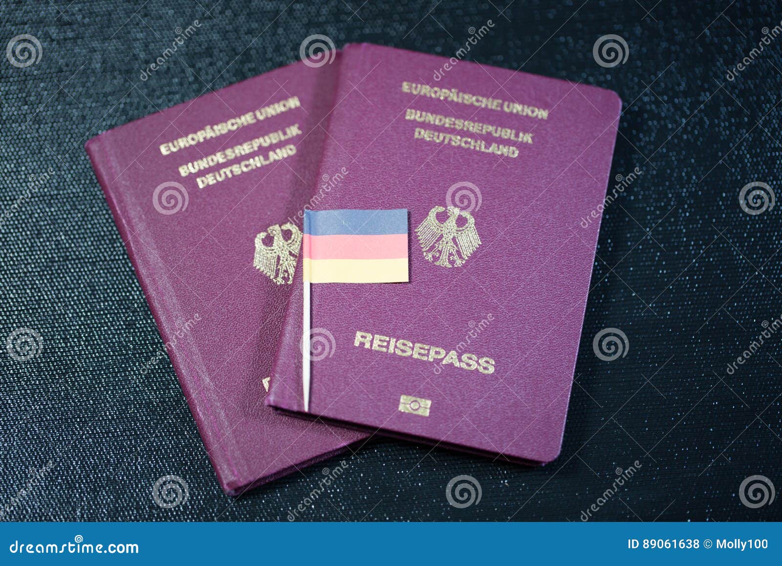 Passport, German Passport on Black Background, with Germany Flag Stock ...