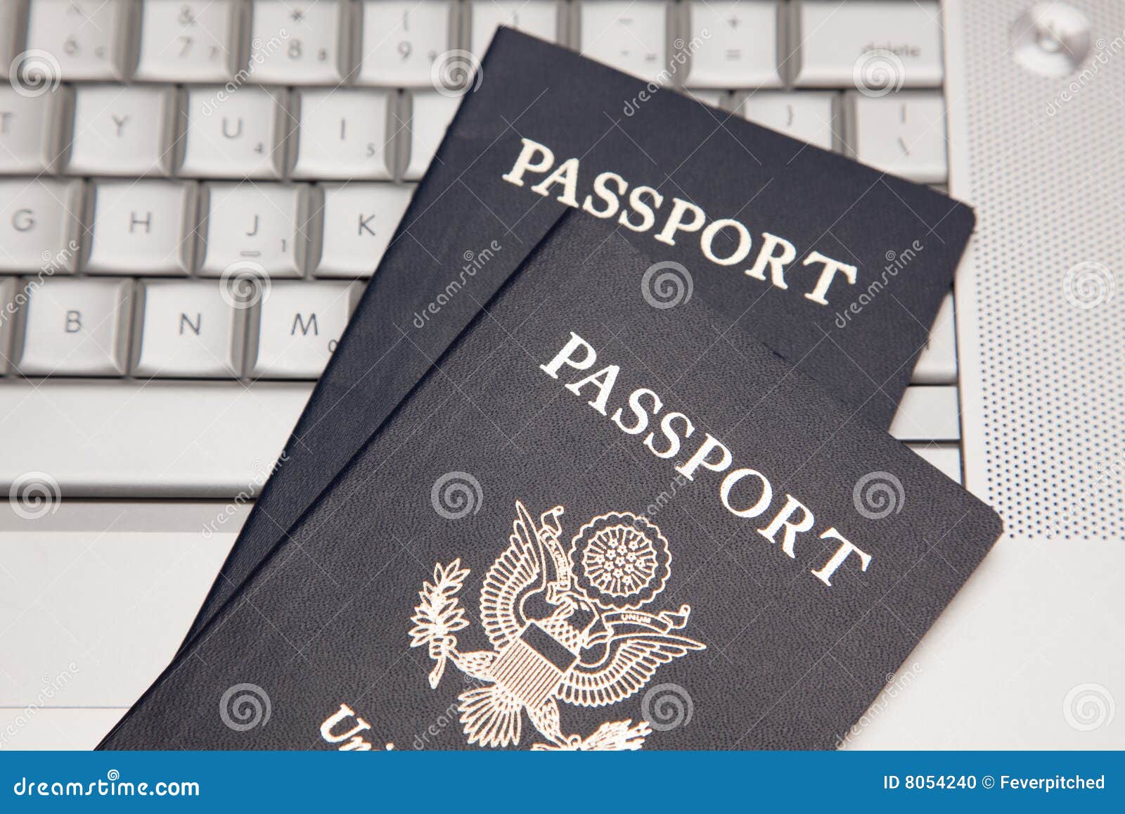 Passports on Laptop Keyboard Stock Photo - Image of permit, outing: 8054240