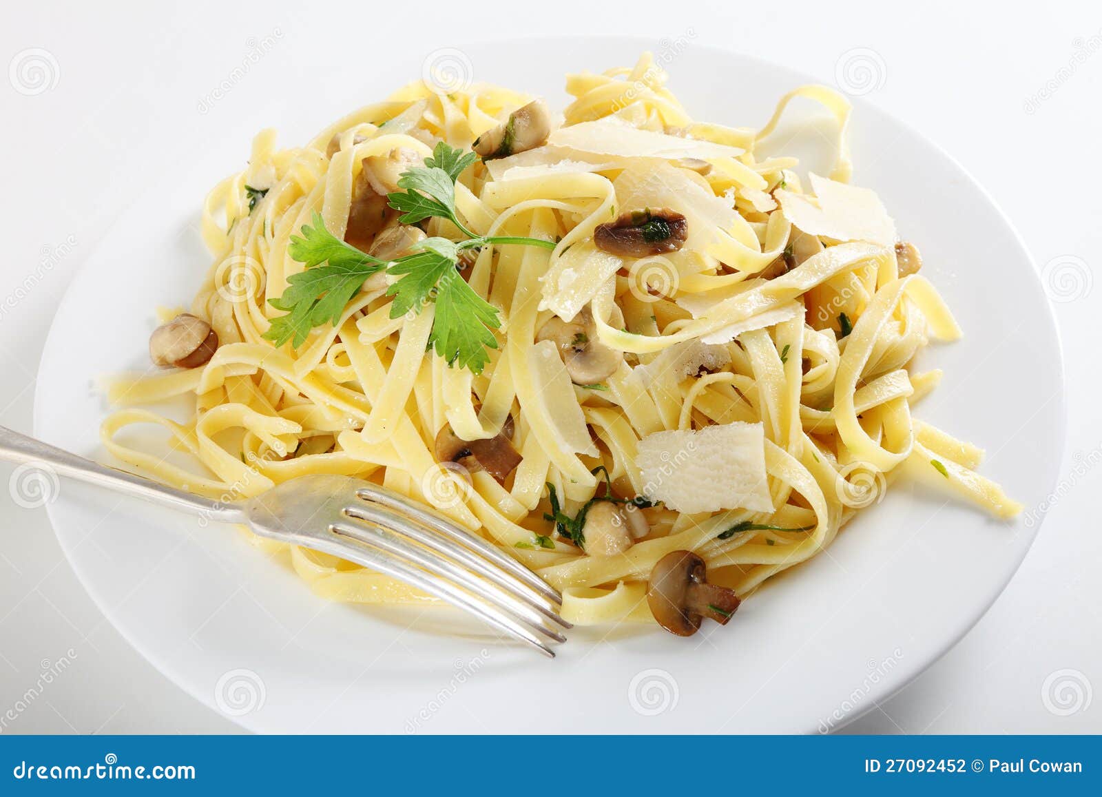 Pasta ai funghi with fork stock photo. Image of parmesan - 27092452