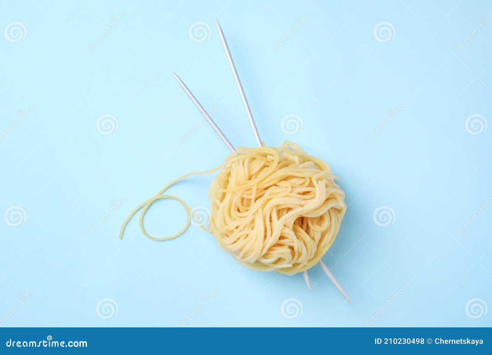 Pasta As Clew with Knitting Needles on Light Blue Background, Top View ...