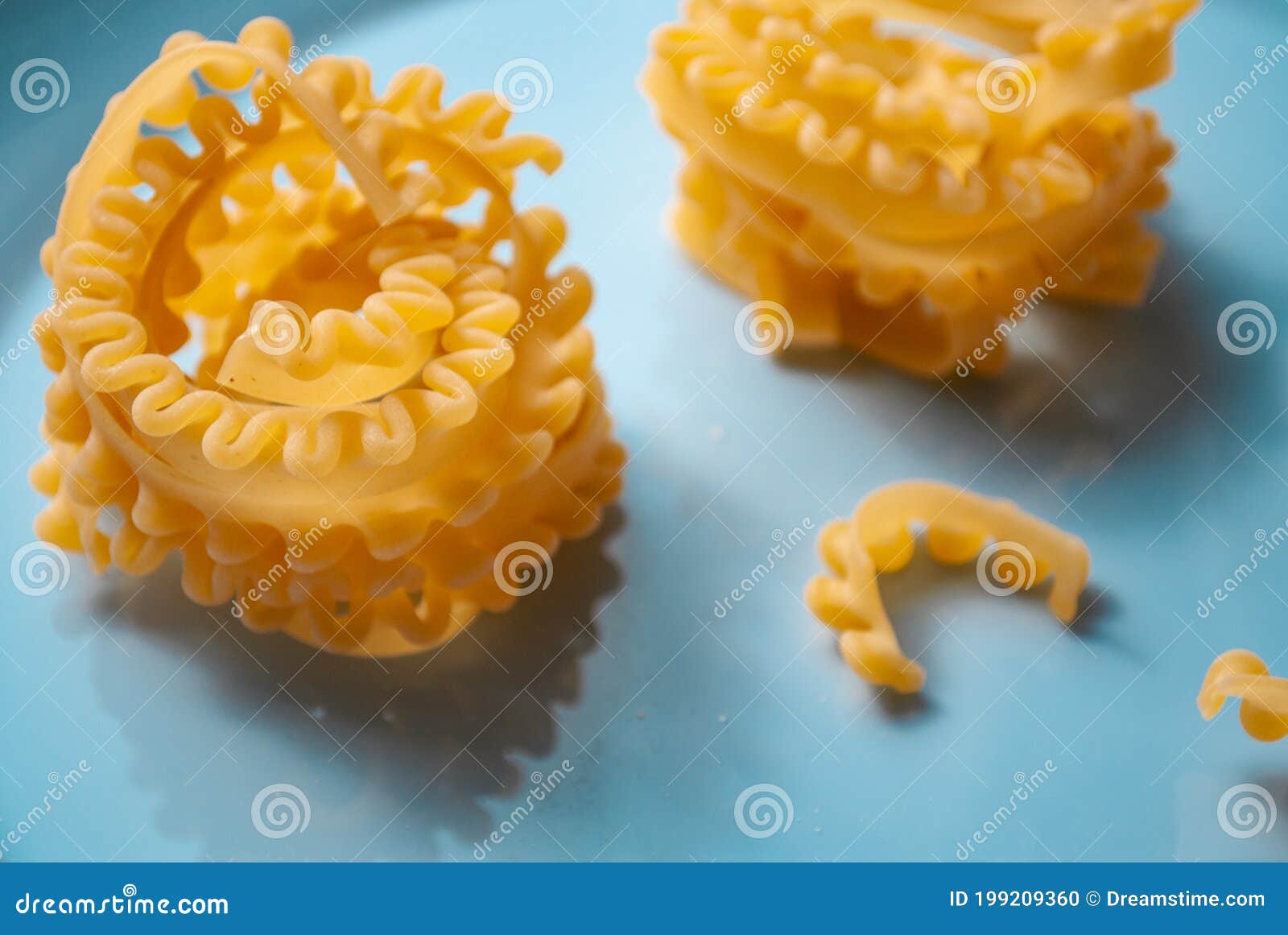 Pasta on a Blue Plate Closeup Stock Photo - Image of closeup, health ...