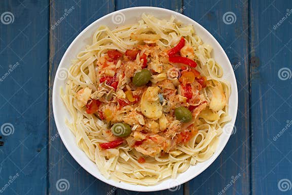 Pasta with cod fish stock image. Image of olive, pepper - 52044847