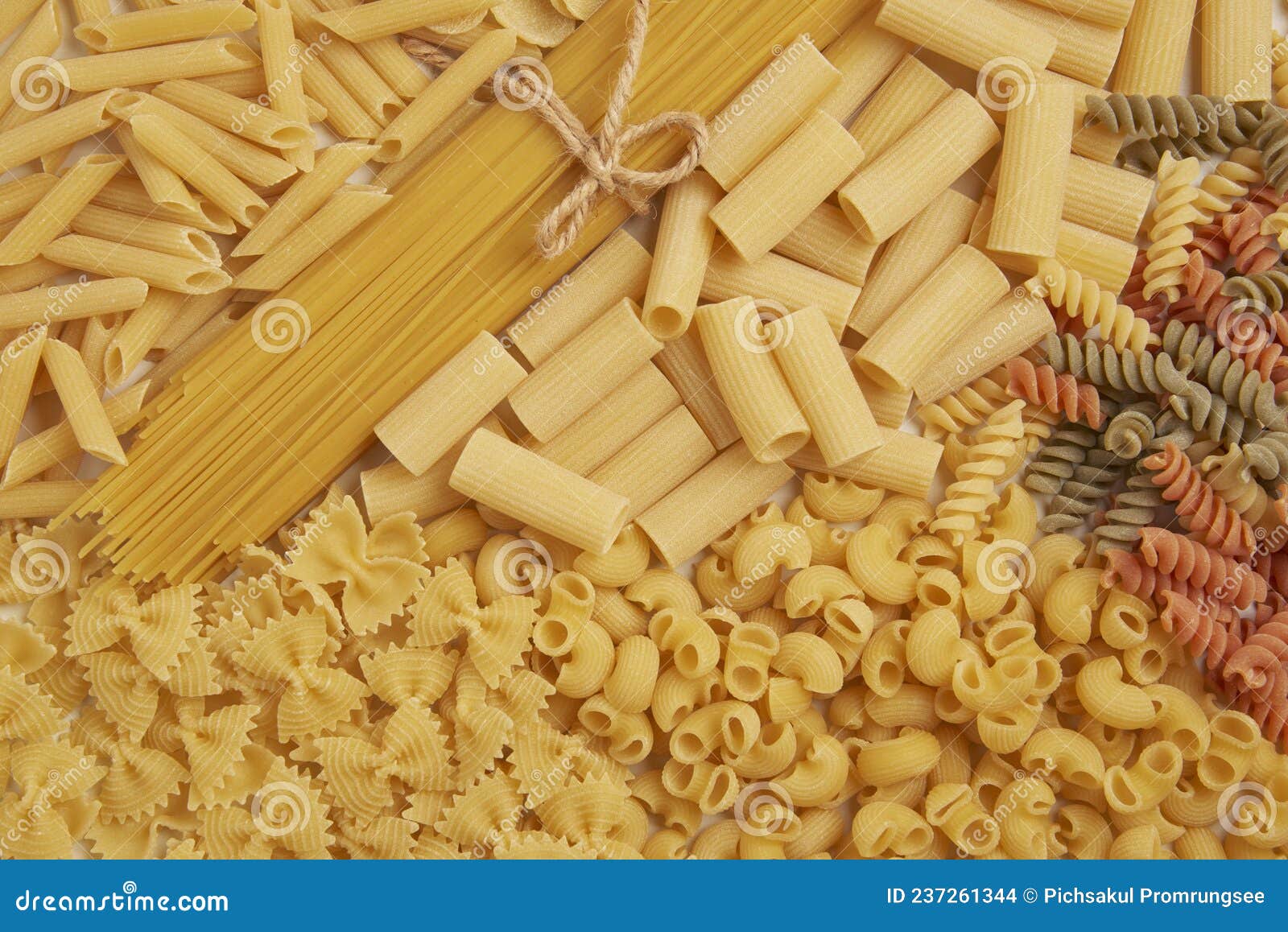 Pasta Concept Various Types of Dry Pasta Being Sorted into Five Groups ...
