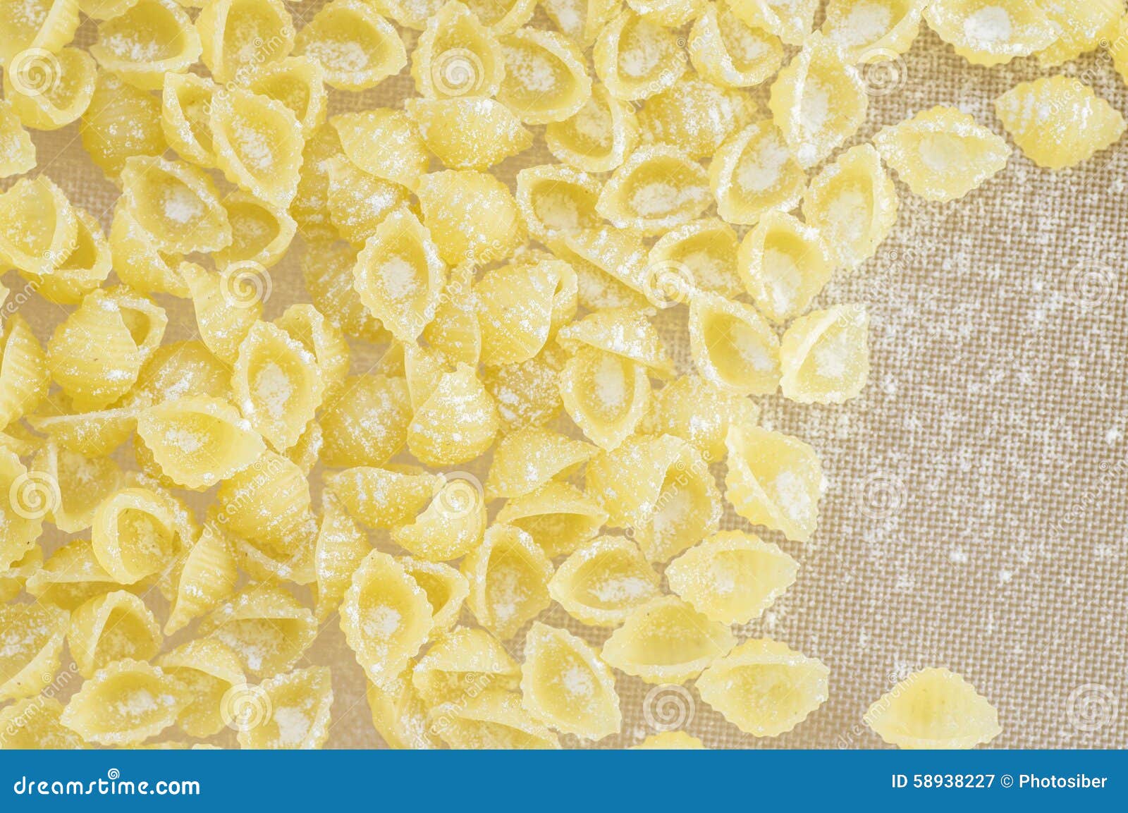 Pasta Conchigliette in Flour on the Table Stock Image - Image of food ...