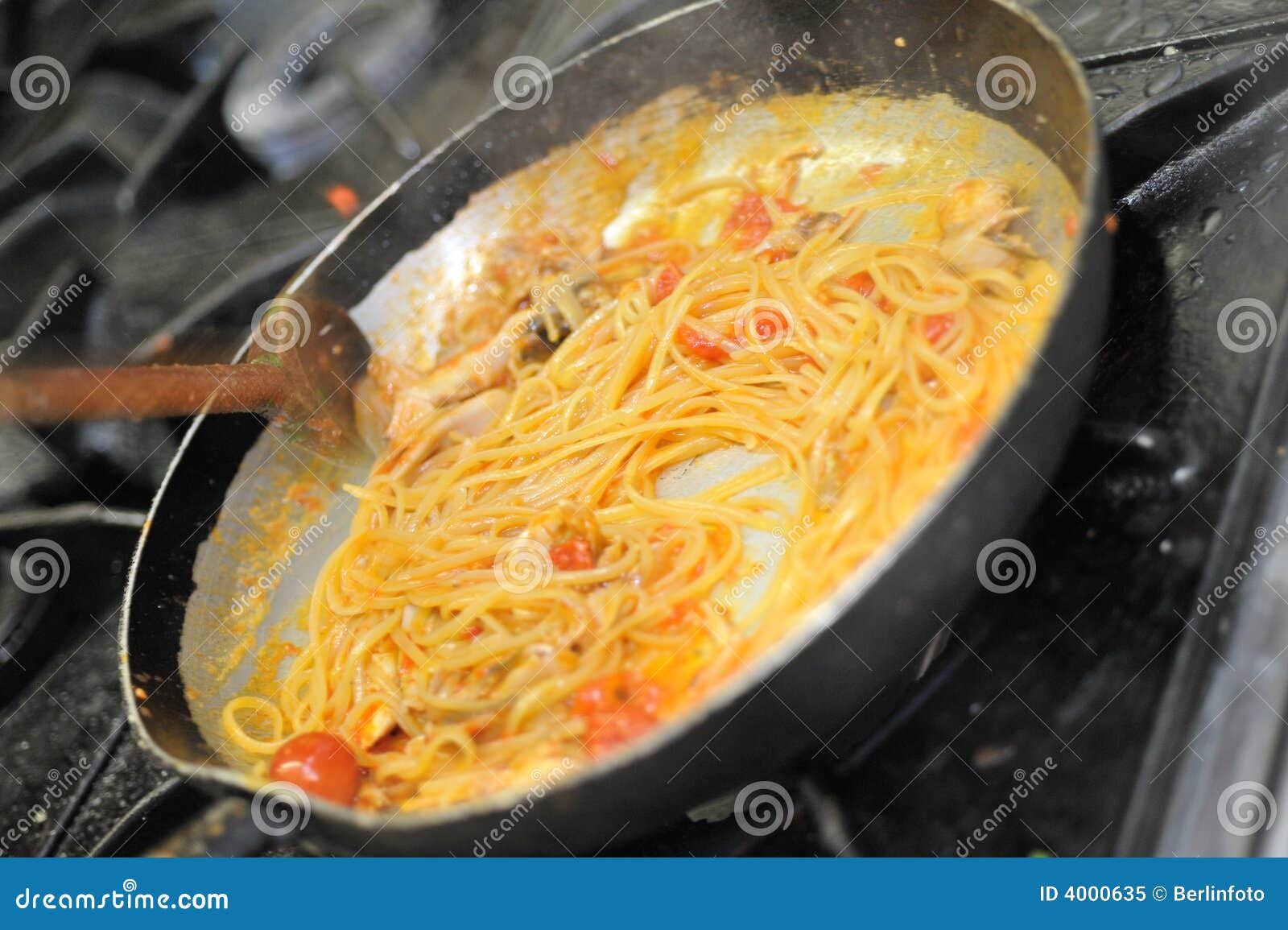 Pasta cooking stock image. Image of saucepan, tomatoes - 4000635
