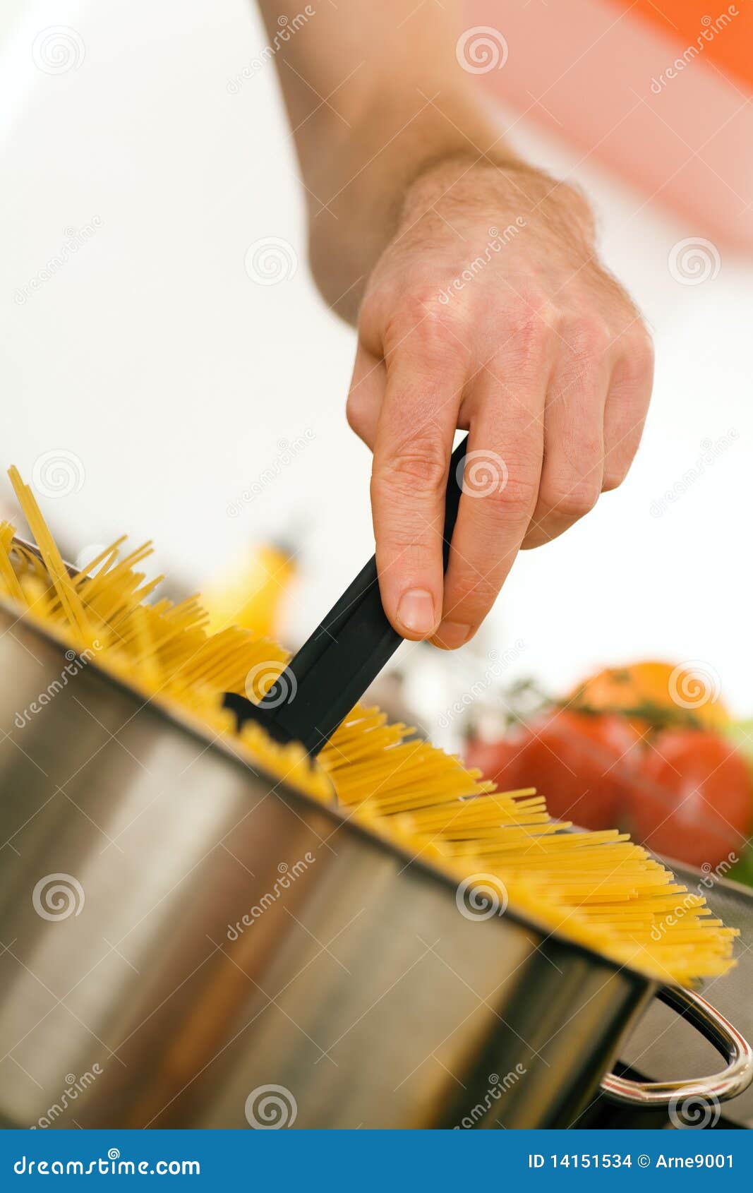 Pasta cooking in a pot stock photo. Image of hand, preparing - 14151534