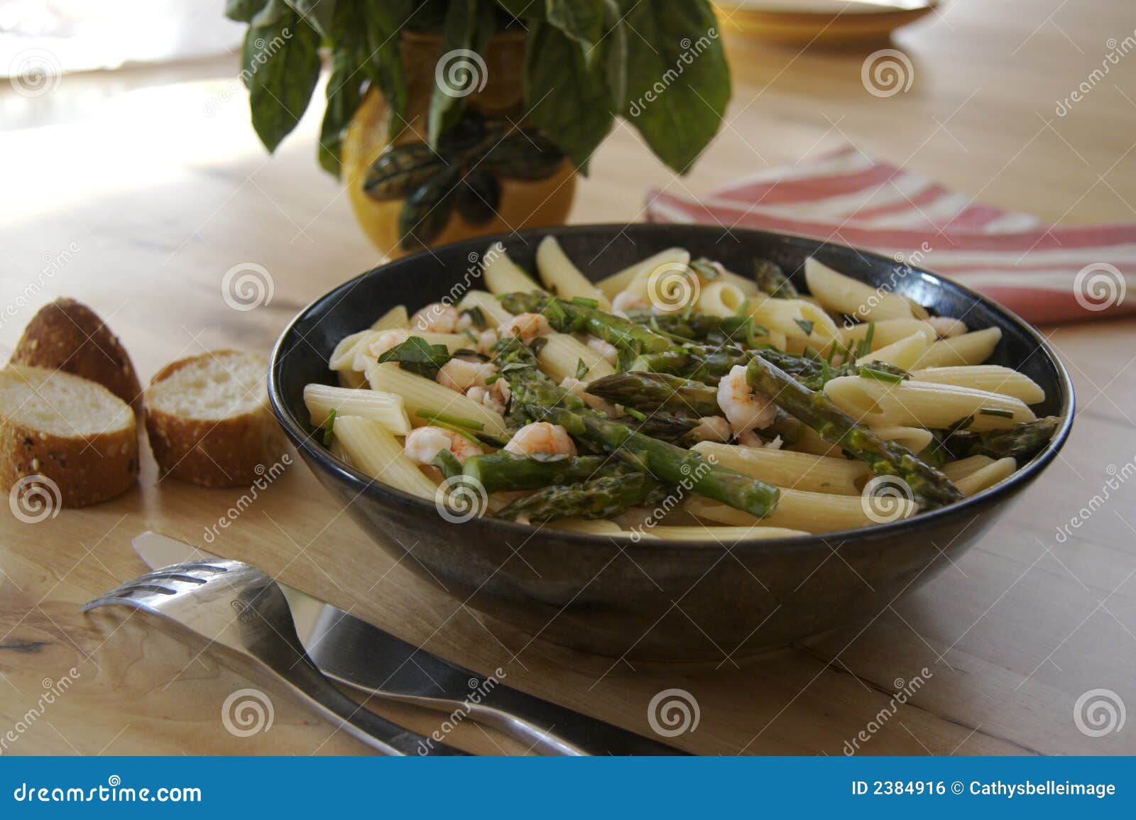Pasta dish stock photo. Image of lunch, bowl, penne, cutlery - 2384916