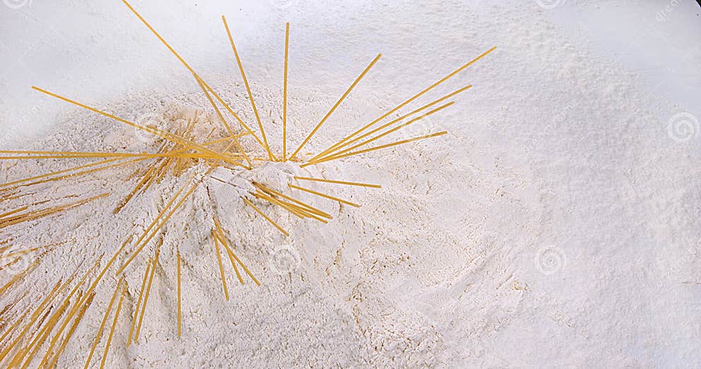 Pasta Falling on Flour Against White Background Stock Photo - Image of ...