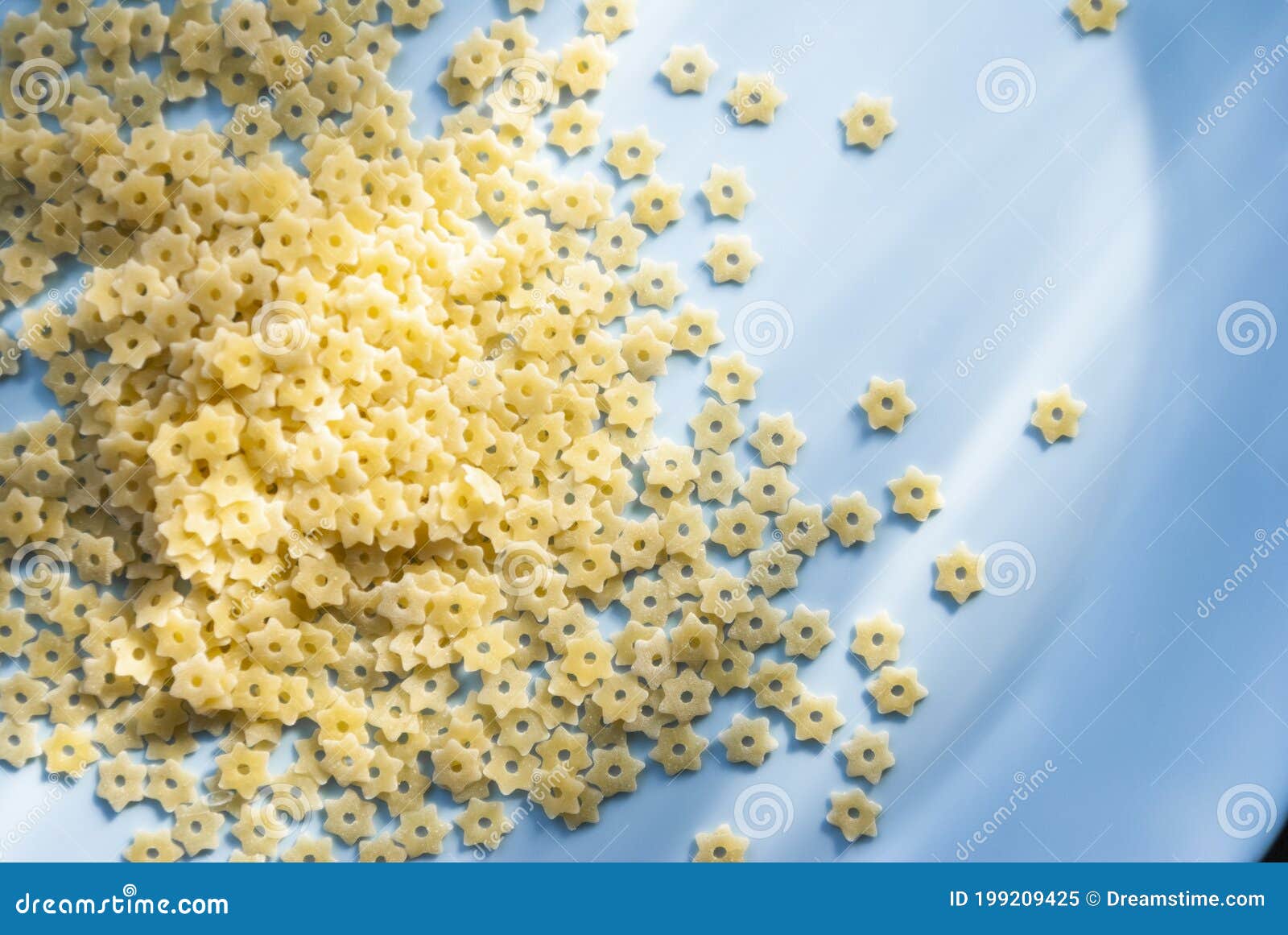 Pasta in the form of stars stock image. Image of collection - 199209425