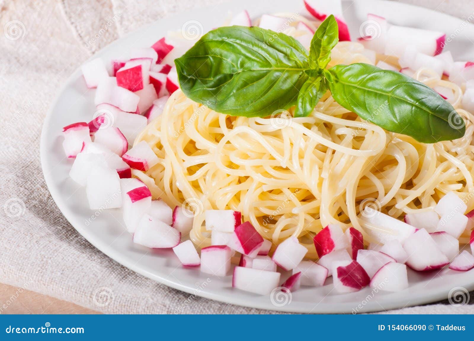 Pasta Garnish with Radish and Basil Stock Photo - Image of dinner ...
