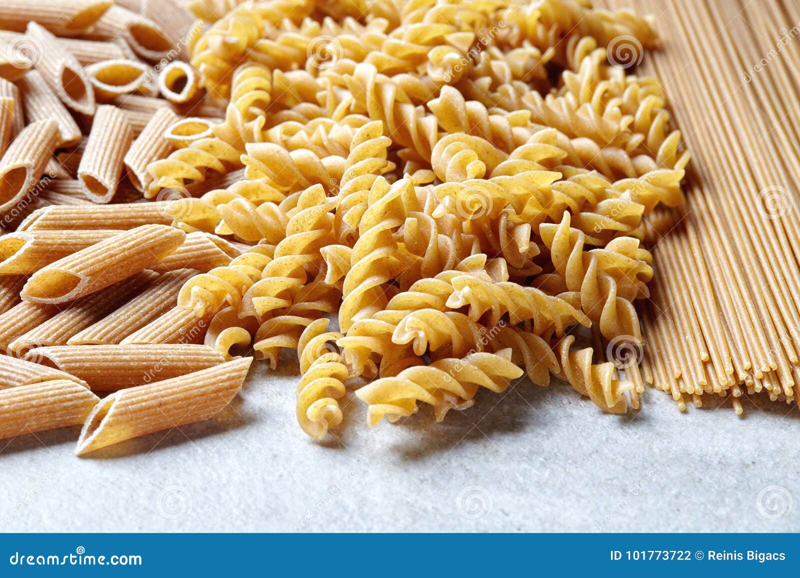 Various Types of Pasta on Stone Table Stock Photo - Image of penne ...