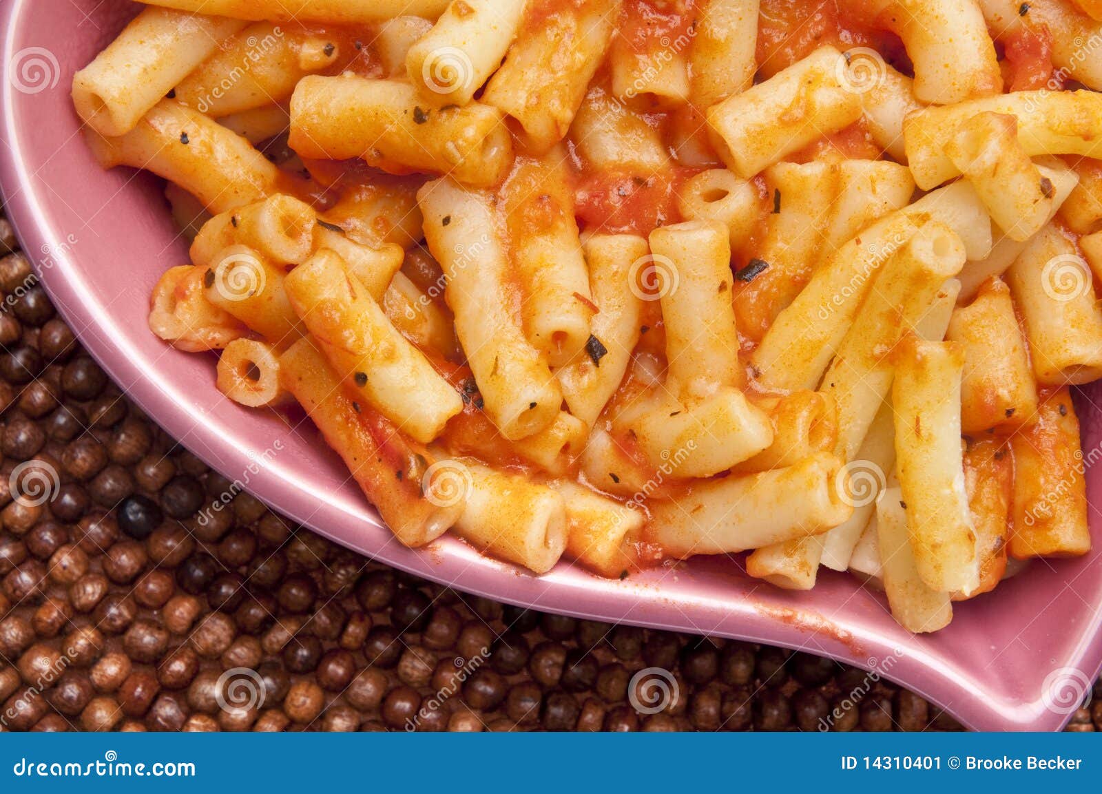 Pasta in Heart Shaped Bowl stock image. Image of studio - 14310401