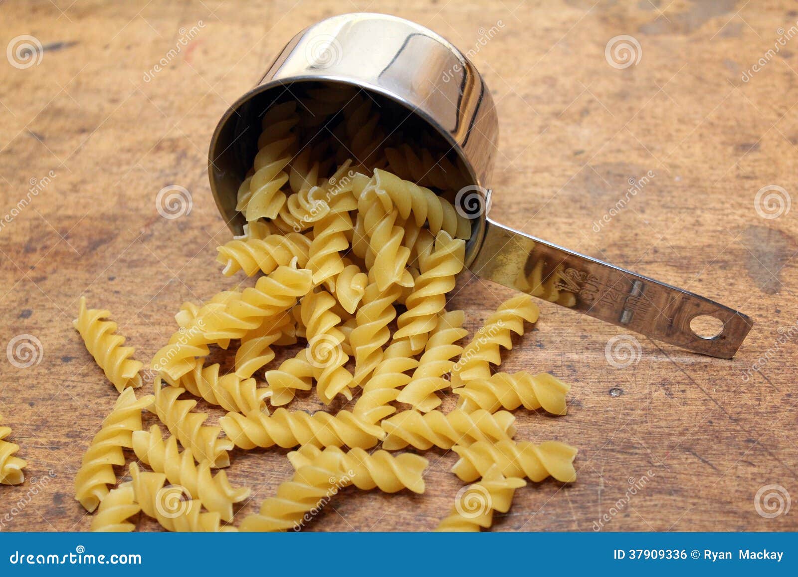 Pasta in measuring cup stock photo. Image of italian - 37909336