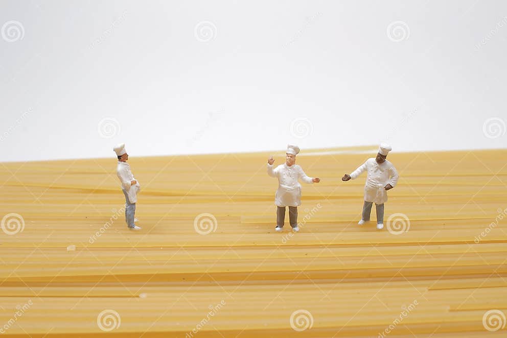 The Pasta and a Mini Chef Figure Stock Photo - Image of lunch, isolated ...