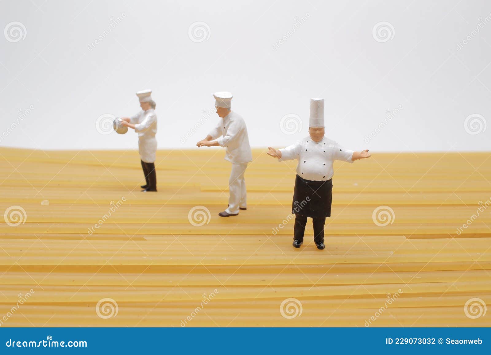 The Pasta and a Mini Chef Figure Stock Photo - Image of bunch, long ...