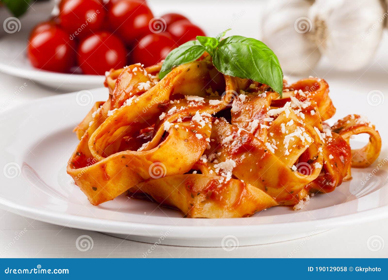 Pasta Tagiatelle with Tomato Stock Photo - Image of italian, green ...