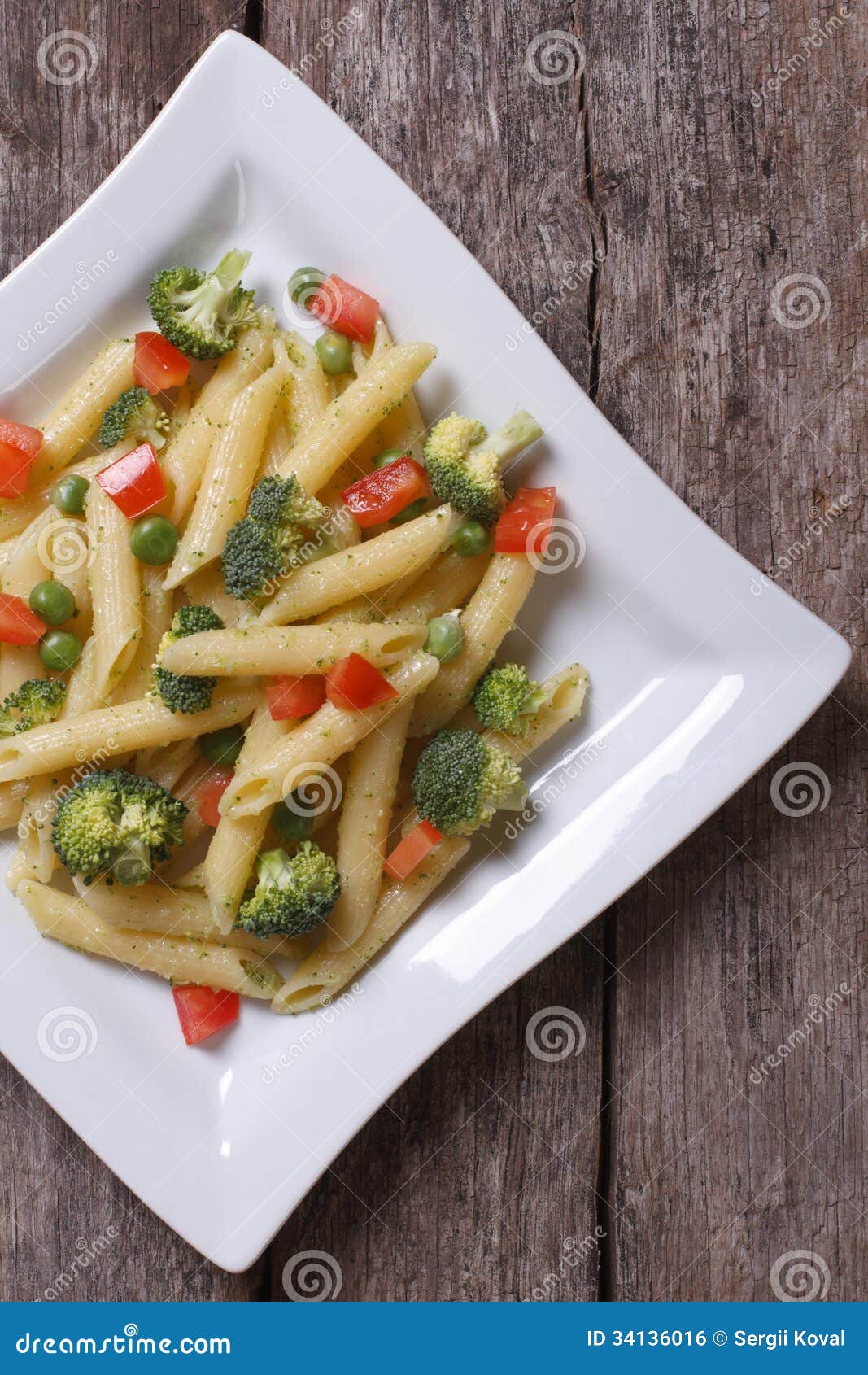 Pasta with Vegetables on the Table in a Square Plate Stock Photo ...