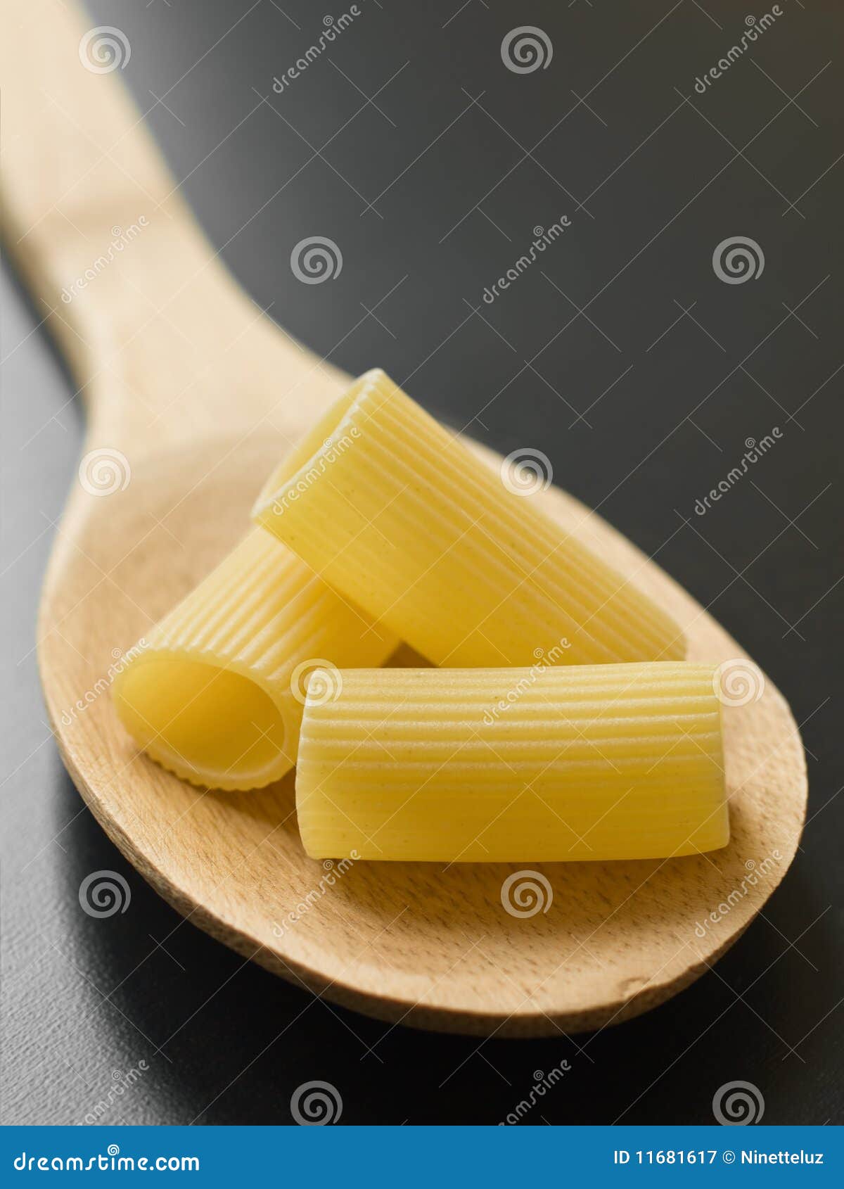 Pasta on wooden spoon stock image. Image of organic, cooking - 11681617