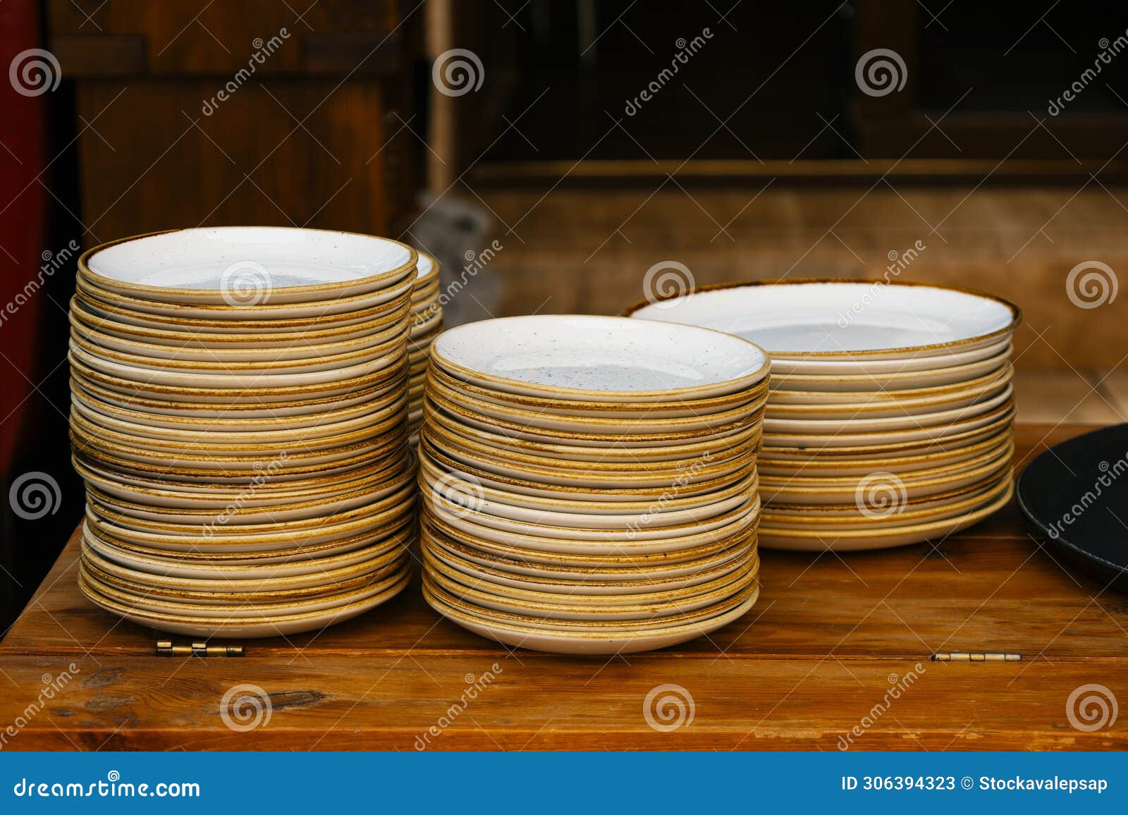 Pastel Ceramic Dinnerware in Cafe Table. Stack of Washed Round Plate on ...