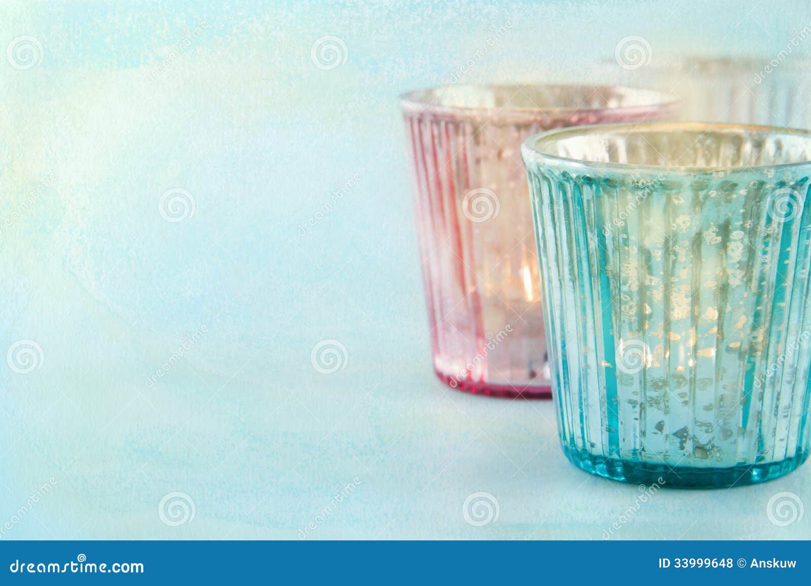 Pastel Color Candles on Blue Textured Background Stock Photo - Image of ...