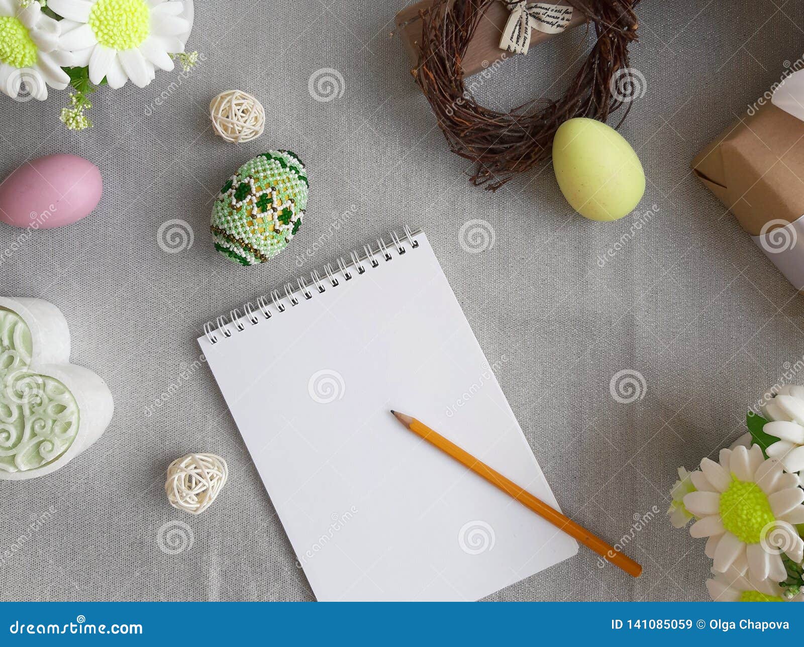 Easter Holiday Decorated Eggs, Blank Paper Notepad on Grey Background ...