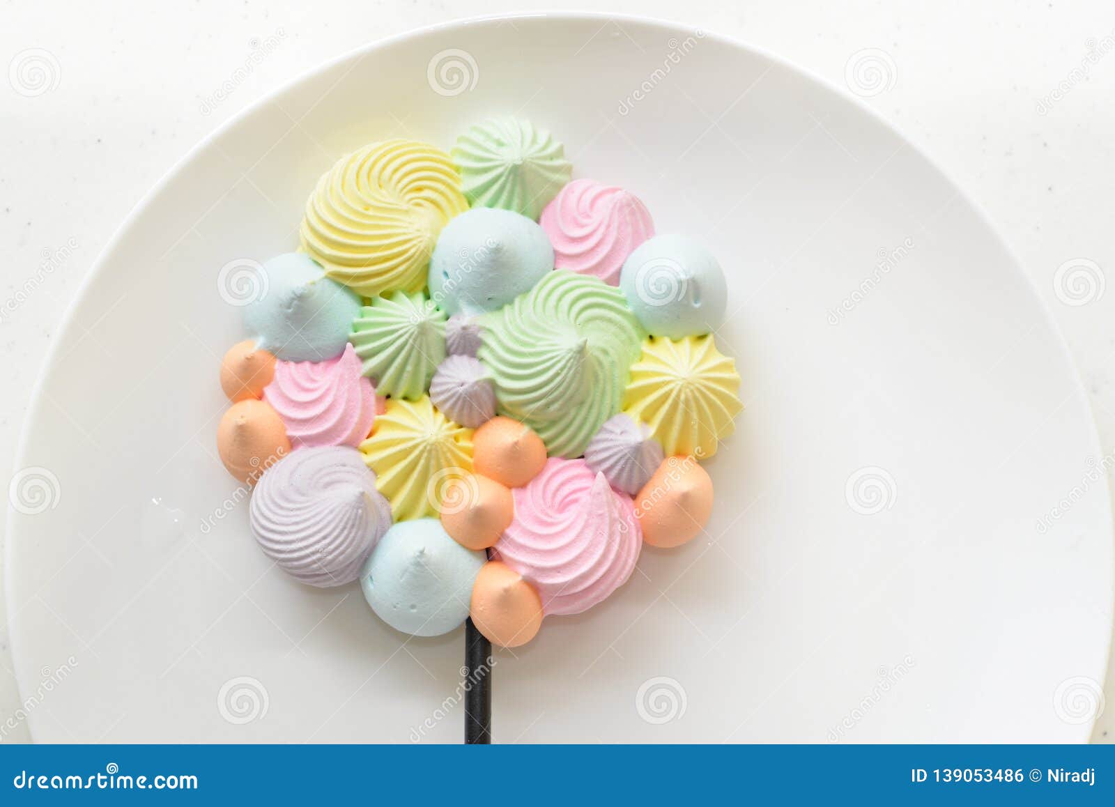 Pastel Meringue with a Stick Stock Photo - Image of violet, stick ...