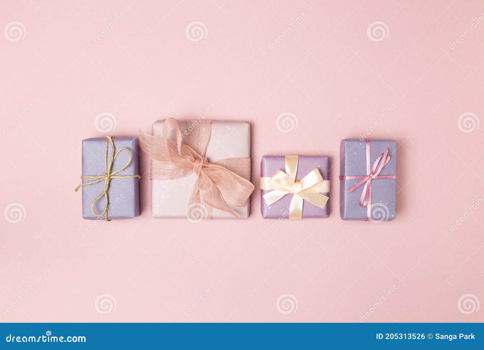 Pastel Pink and Purple Gift Boxes on Pink Background Stock Photo ...