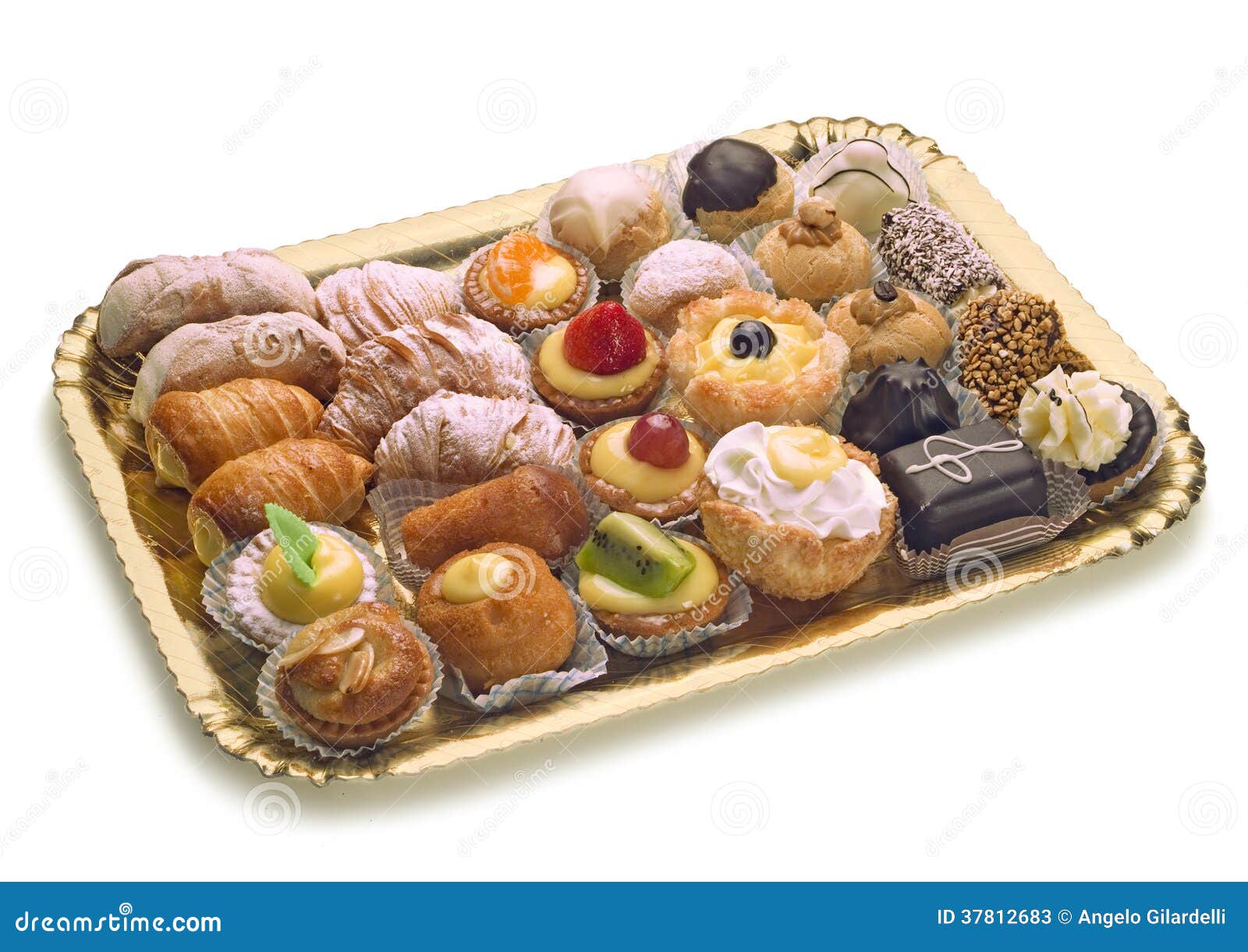 Pastries on golden tray stock image. Image of dessert - 37812683