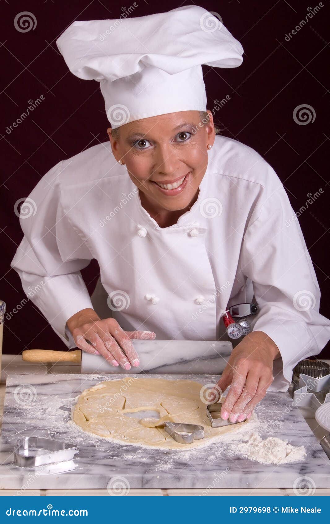 The Pastry Chef Makes Cake Using Modern Equipment For The Production Of ...