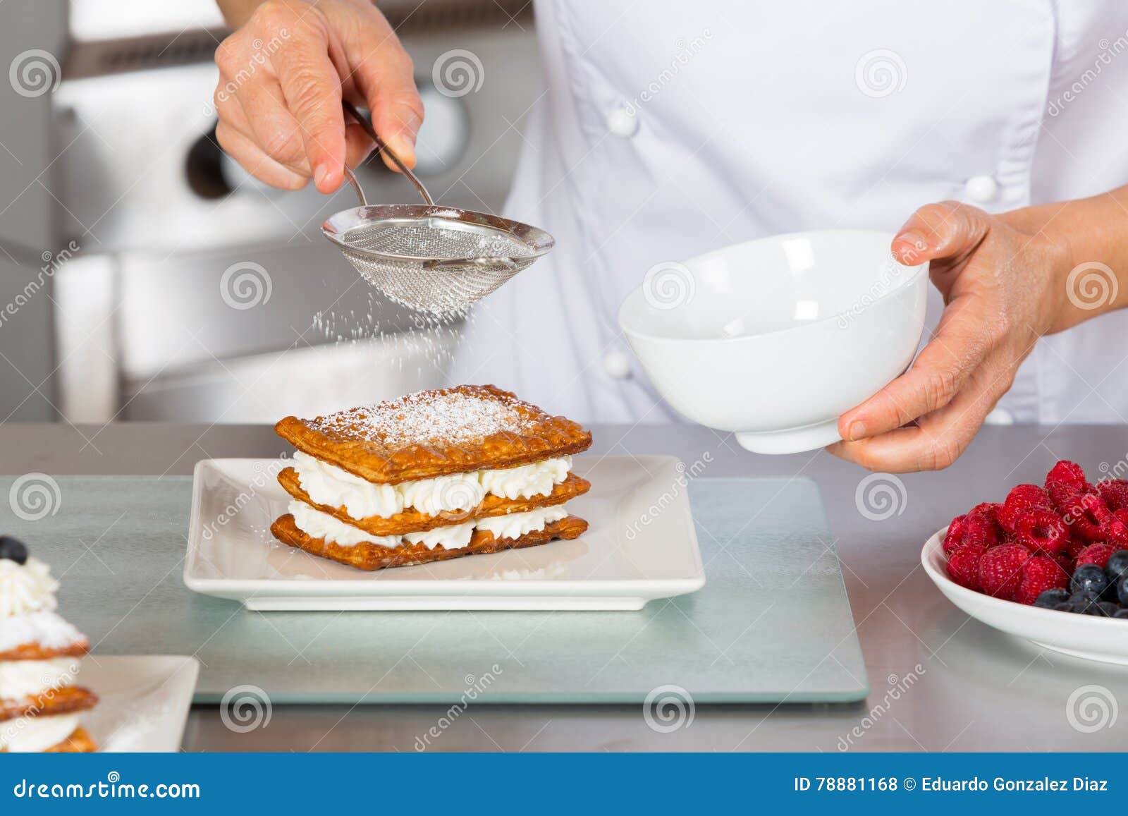 Pastry chef decorating stock photo. Image of lionesa - 78881168