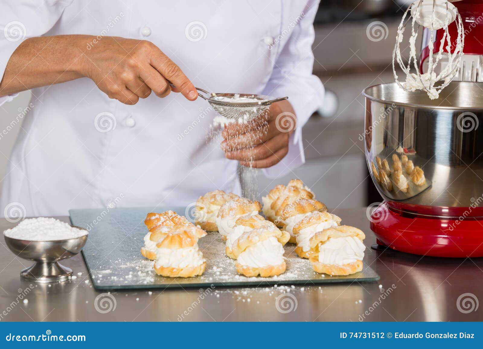 Pastry chef decorating stock photo. Image of garnish - 74731512