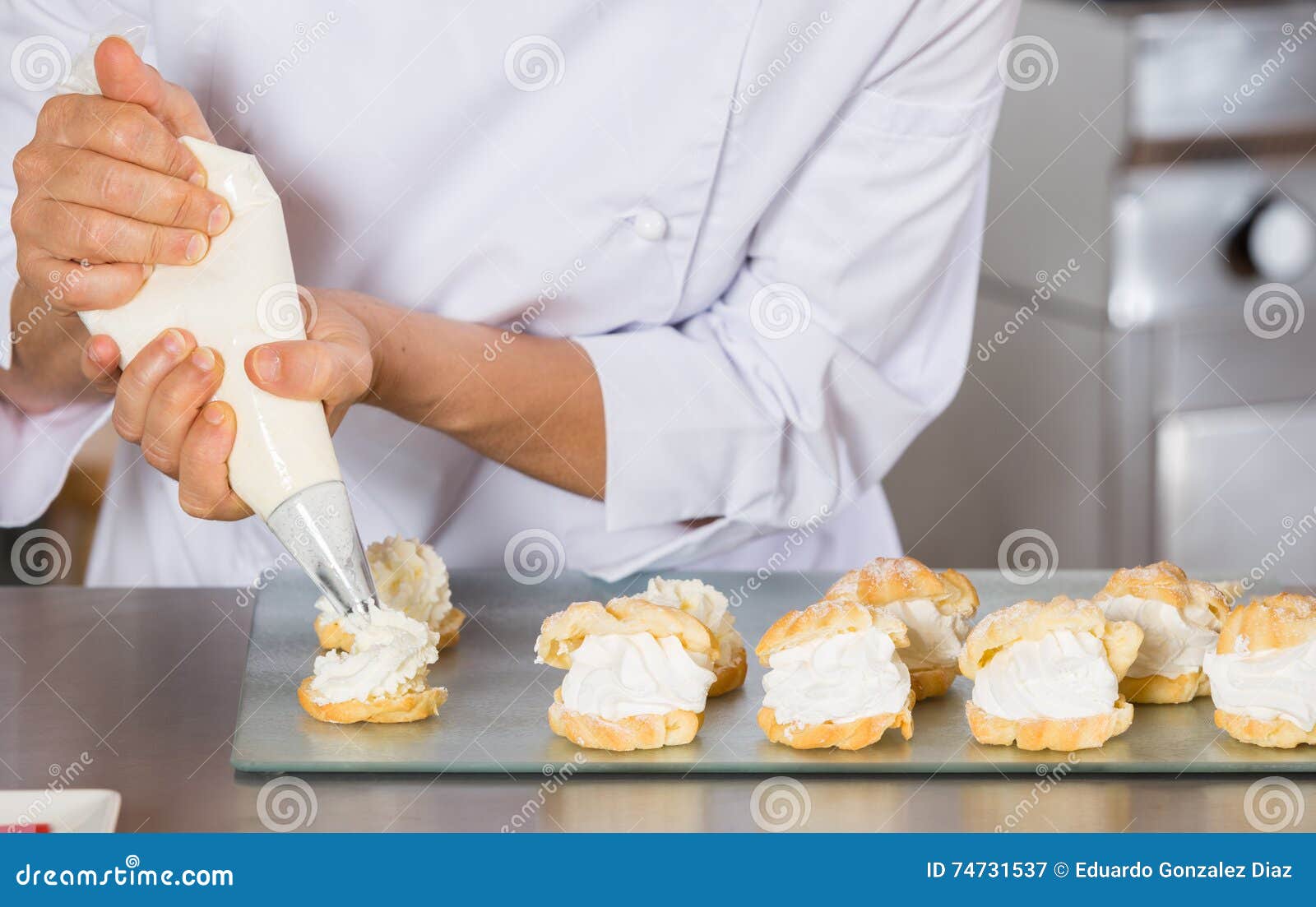 Pastry chef decorating stock image. Image of baker, lionesa - 74731537