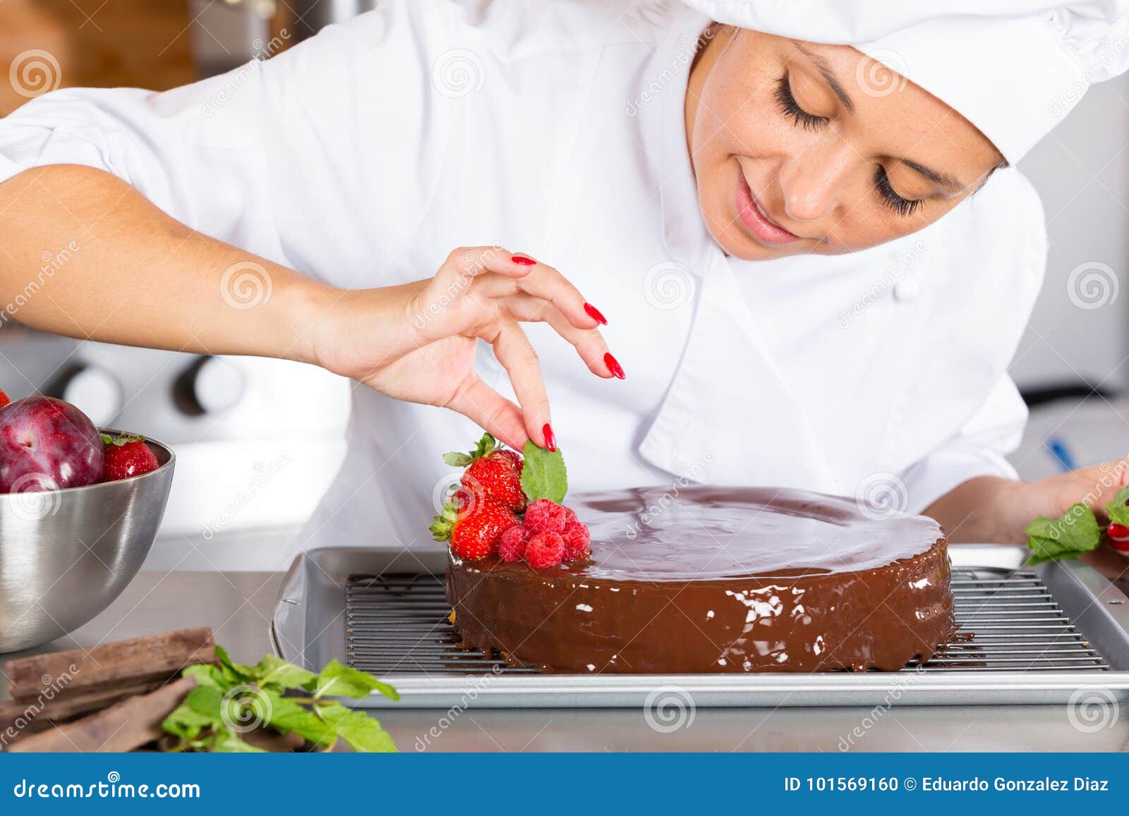 Pastry chef in the kitchen stock photo. Image of dessert - 101569160
