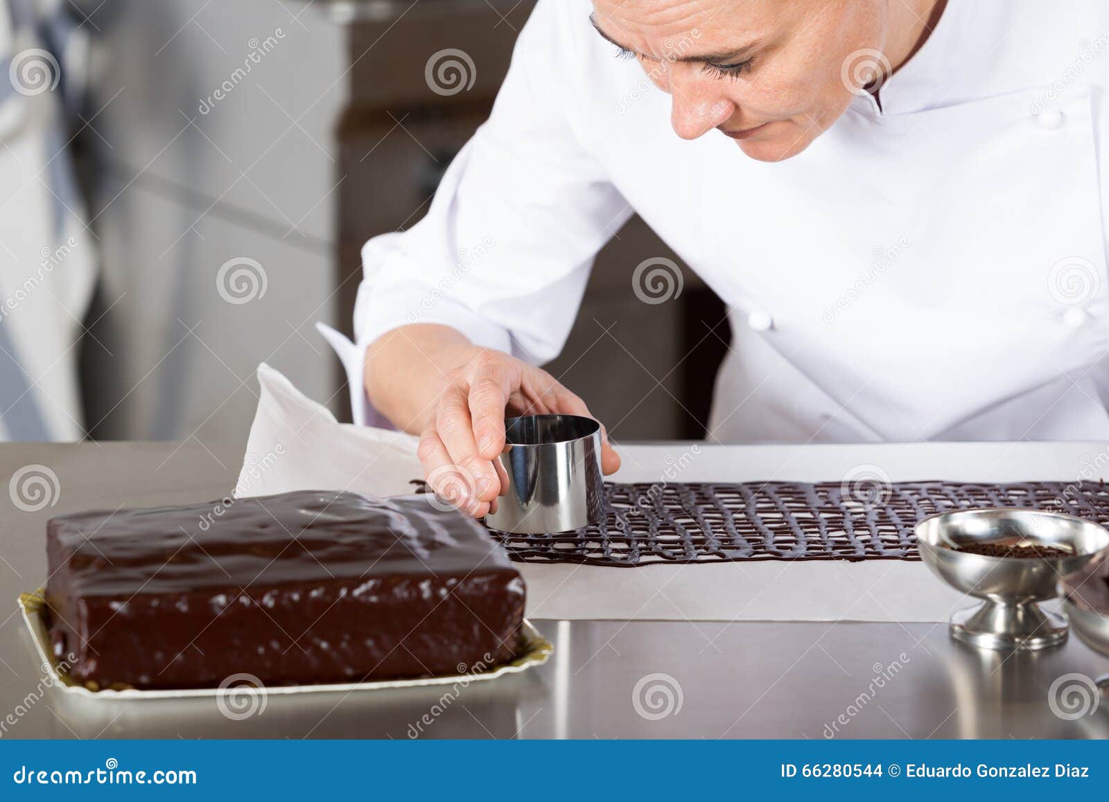 Pastry chef in the kitchen stock photo. Image of boss - 66280544
