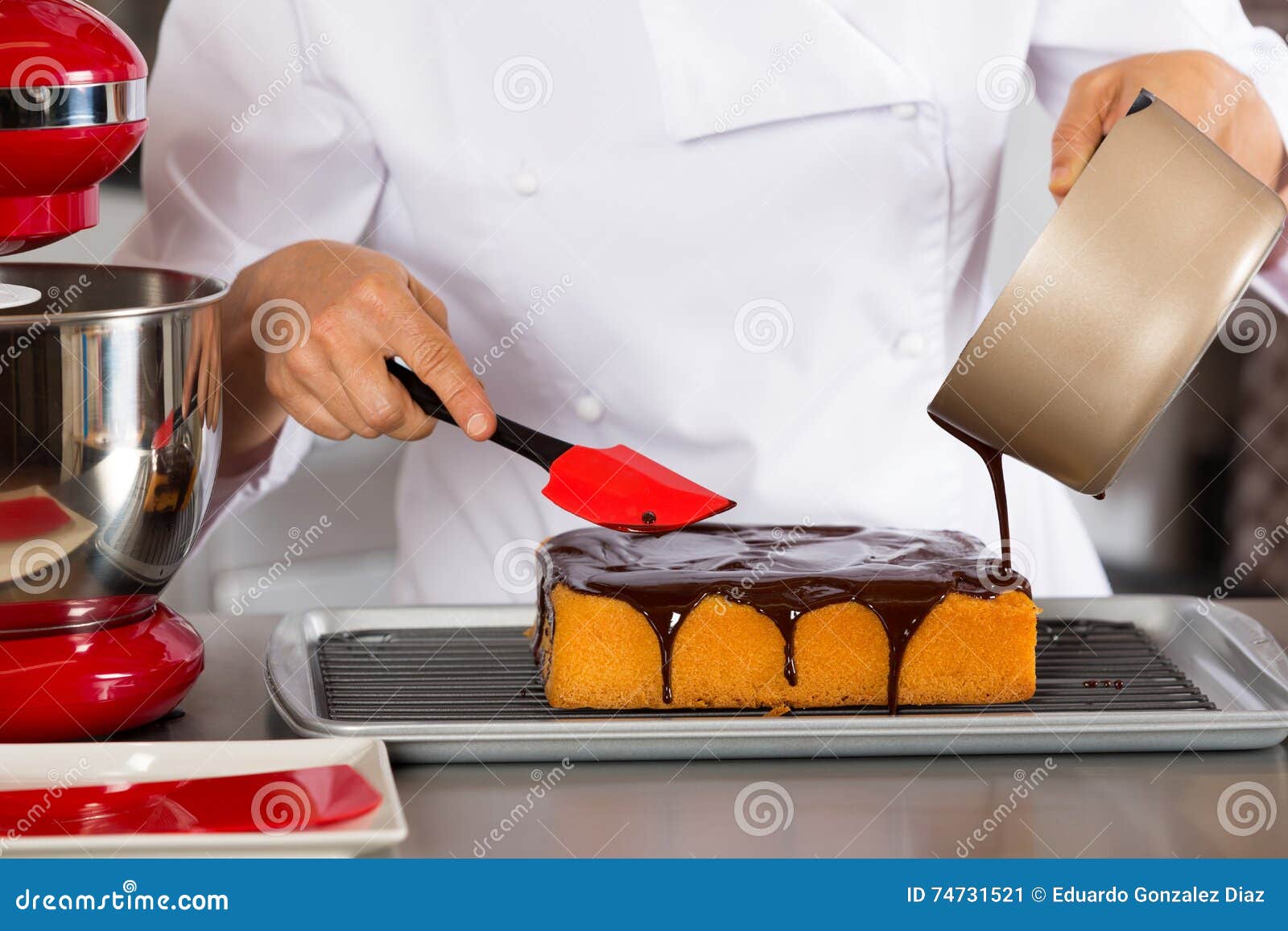 Pastry chef in the kitchen stock image. Image of closeup - 74731521