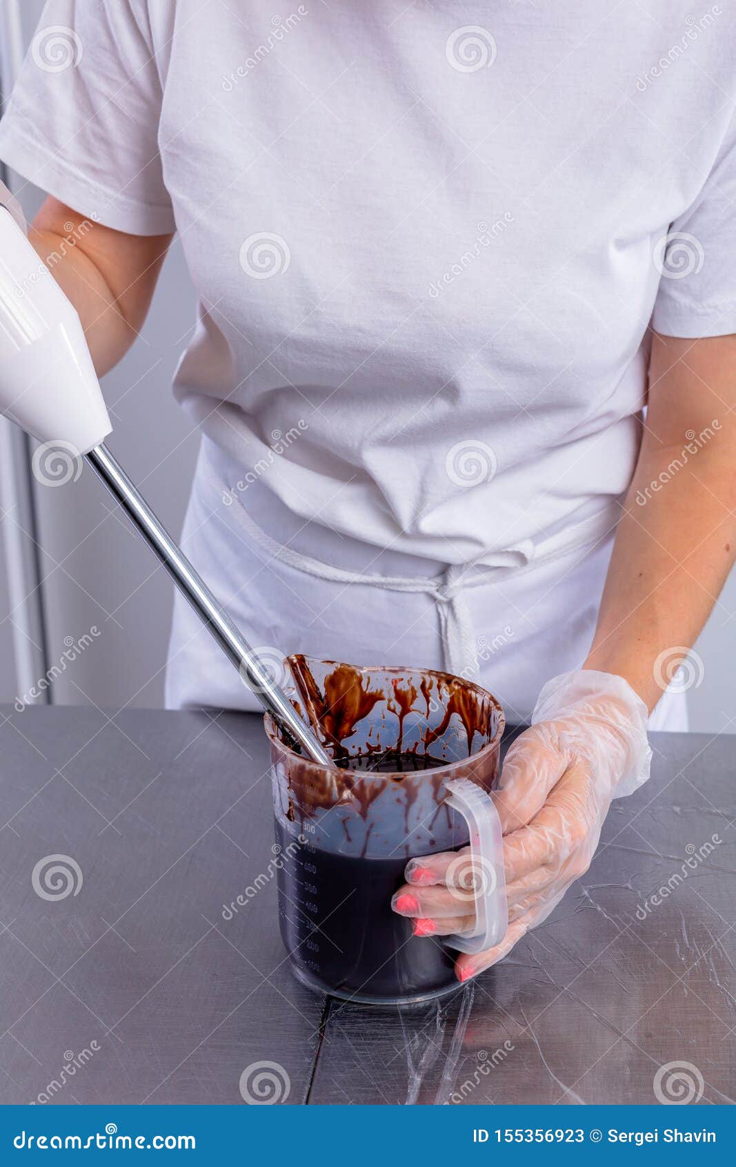 The Pastry Chef in the Kitchen Glazes Pastries. Cook Makes Chocolate ...