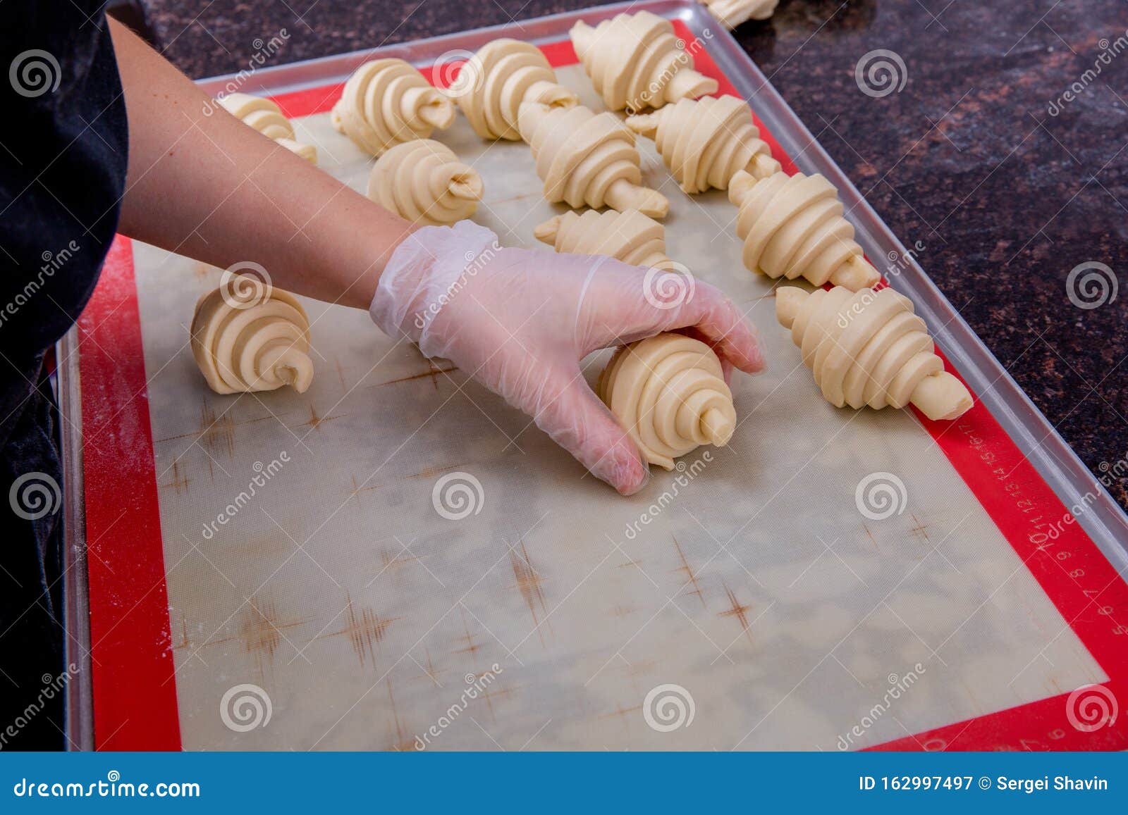 A Pastry Chef in the Kitchen is Making Pastries. the Chef Lays Out the ...