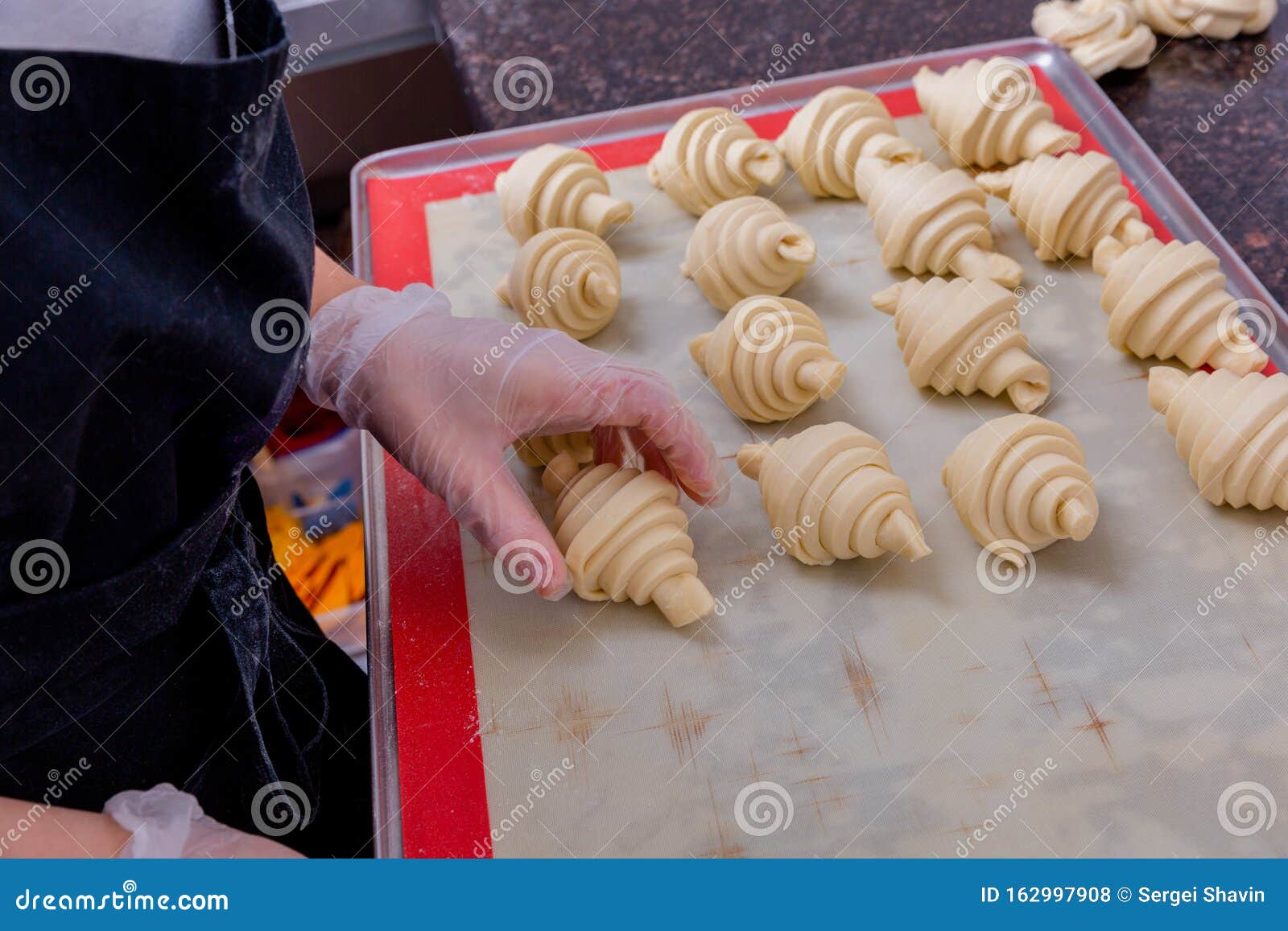 A Pastry Chef in the Kitchen is Making Pastries. the Chef Lays Out the ...