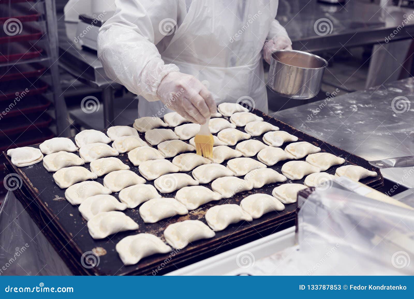 Pastry Chef is Making Buns, Toned Stock Image - Image of baking, chef ...