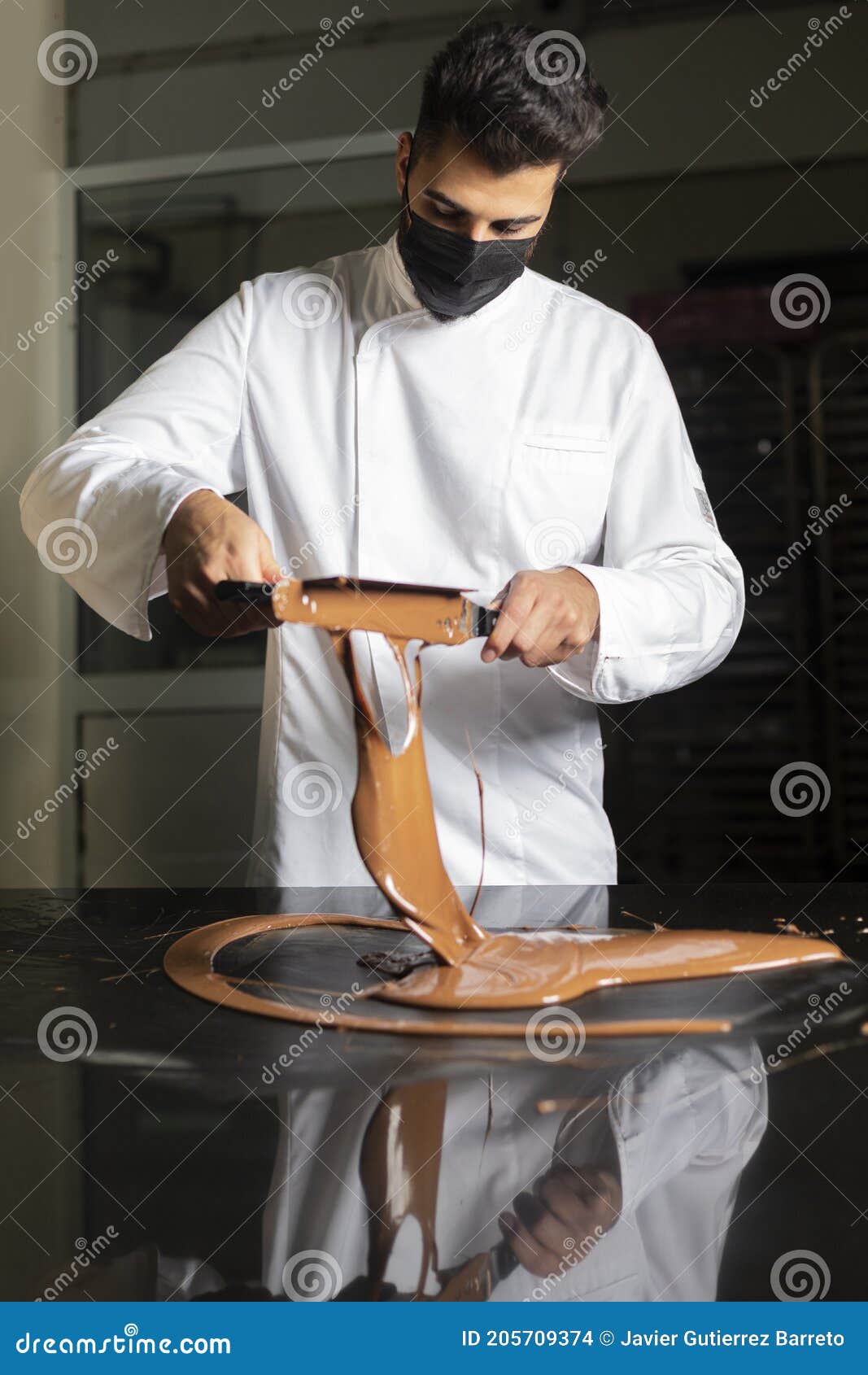 Pastry Chef with Mask Working on Tempering Chocolate Stock Photo ...
