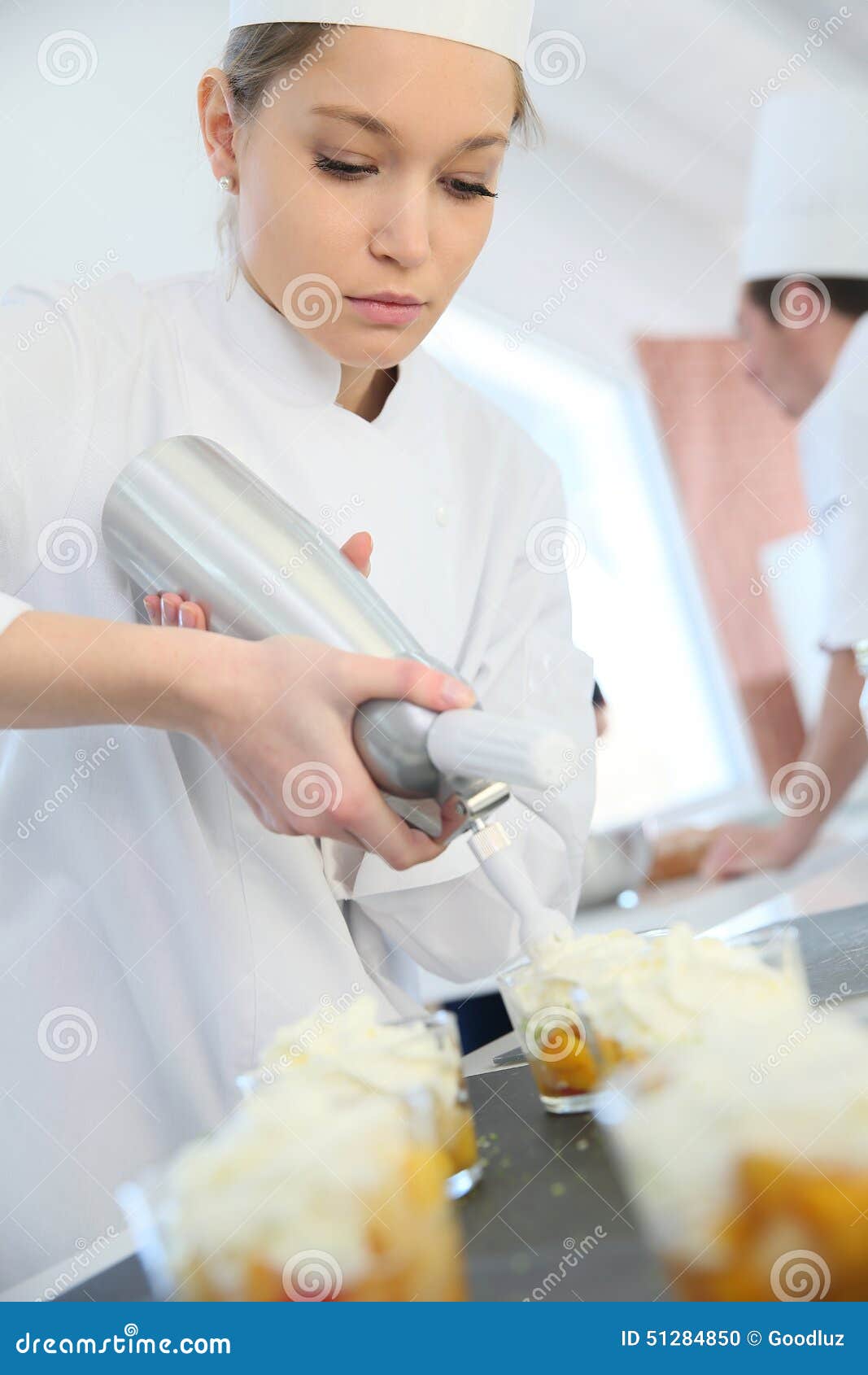 Pastry Chef Putting a Whipped Cream on Dessert Stock Photo - Image of ...
