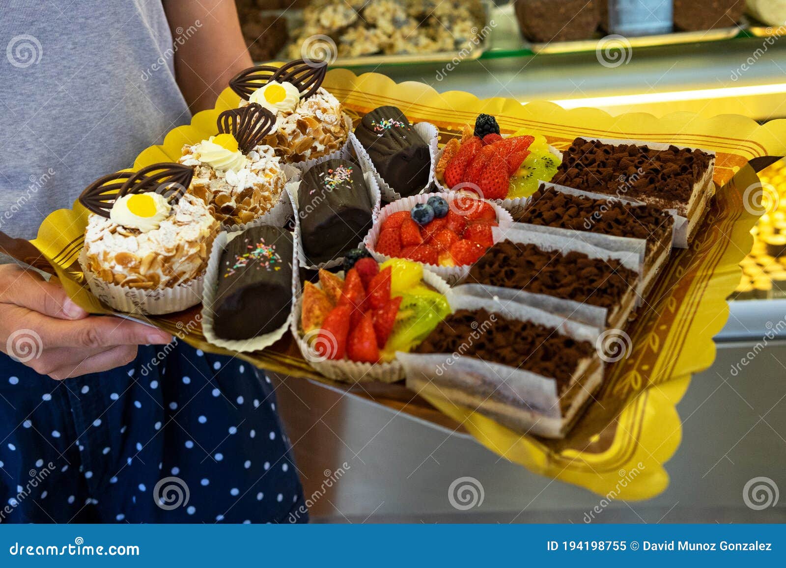 Pastry Chef Taking a Tray with Cakes and Sweets. Stock Image - Image of ...